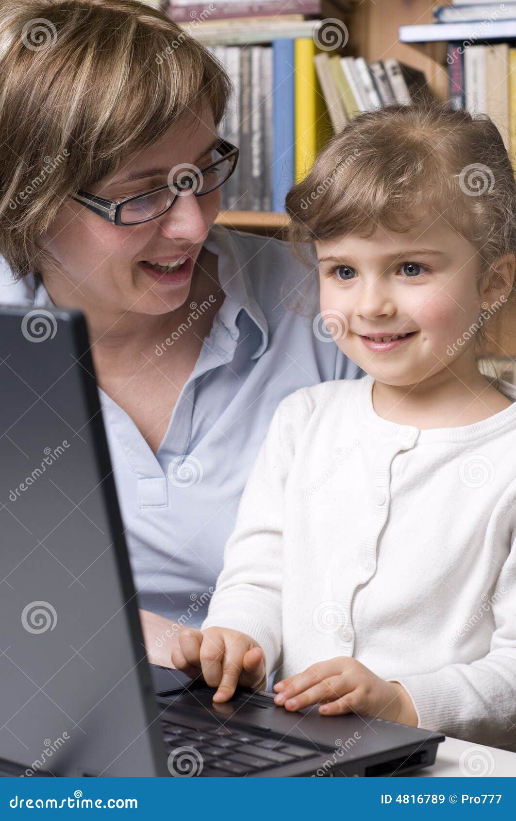 Happy family at computer stock image. Image of caucasian - 4816789