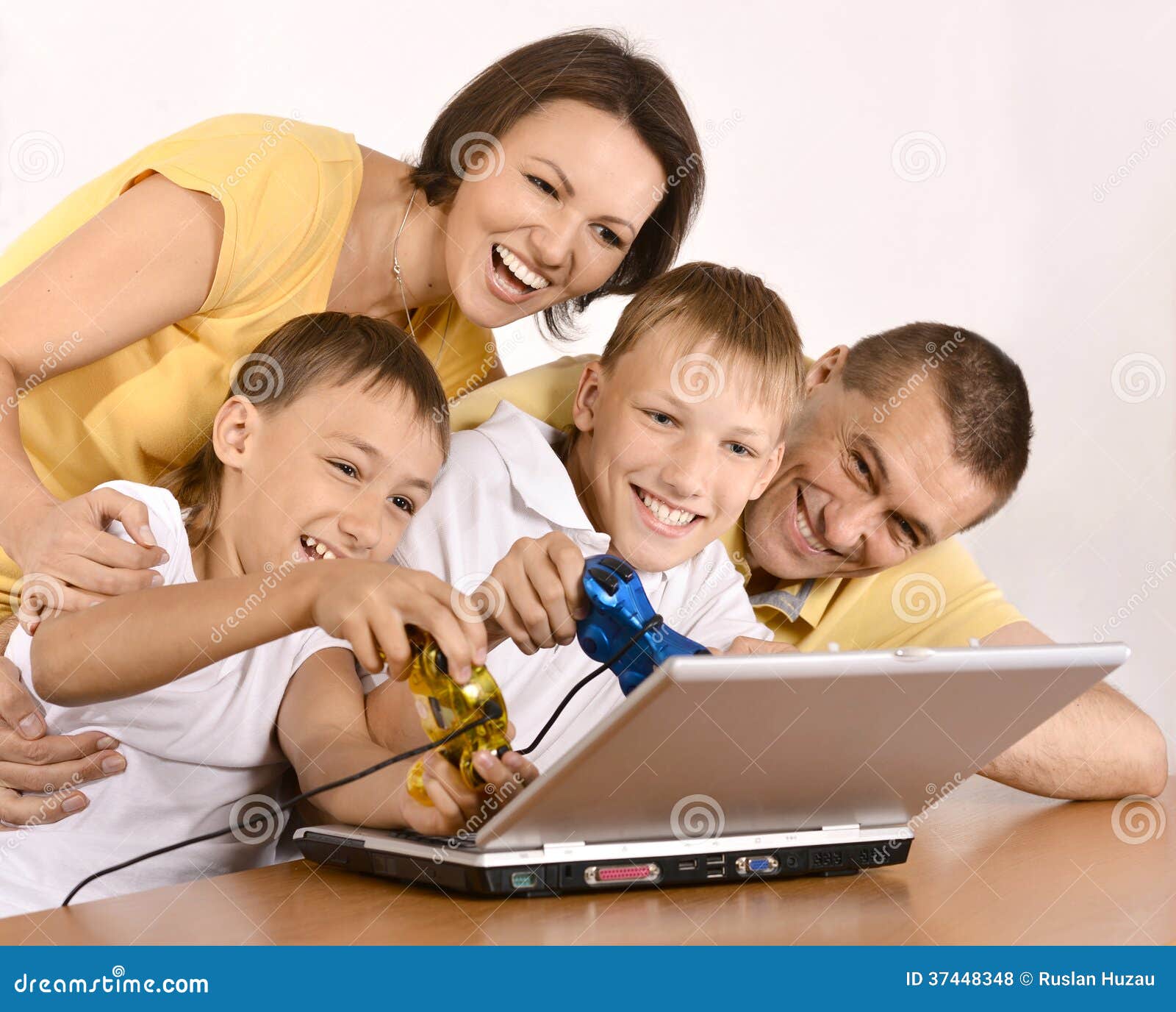 Happy family with computer stock photo. Image of laptop - 37448348