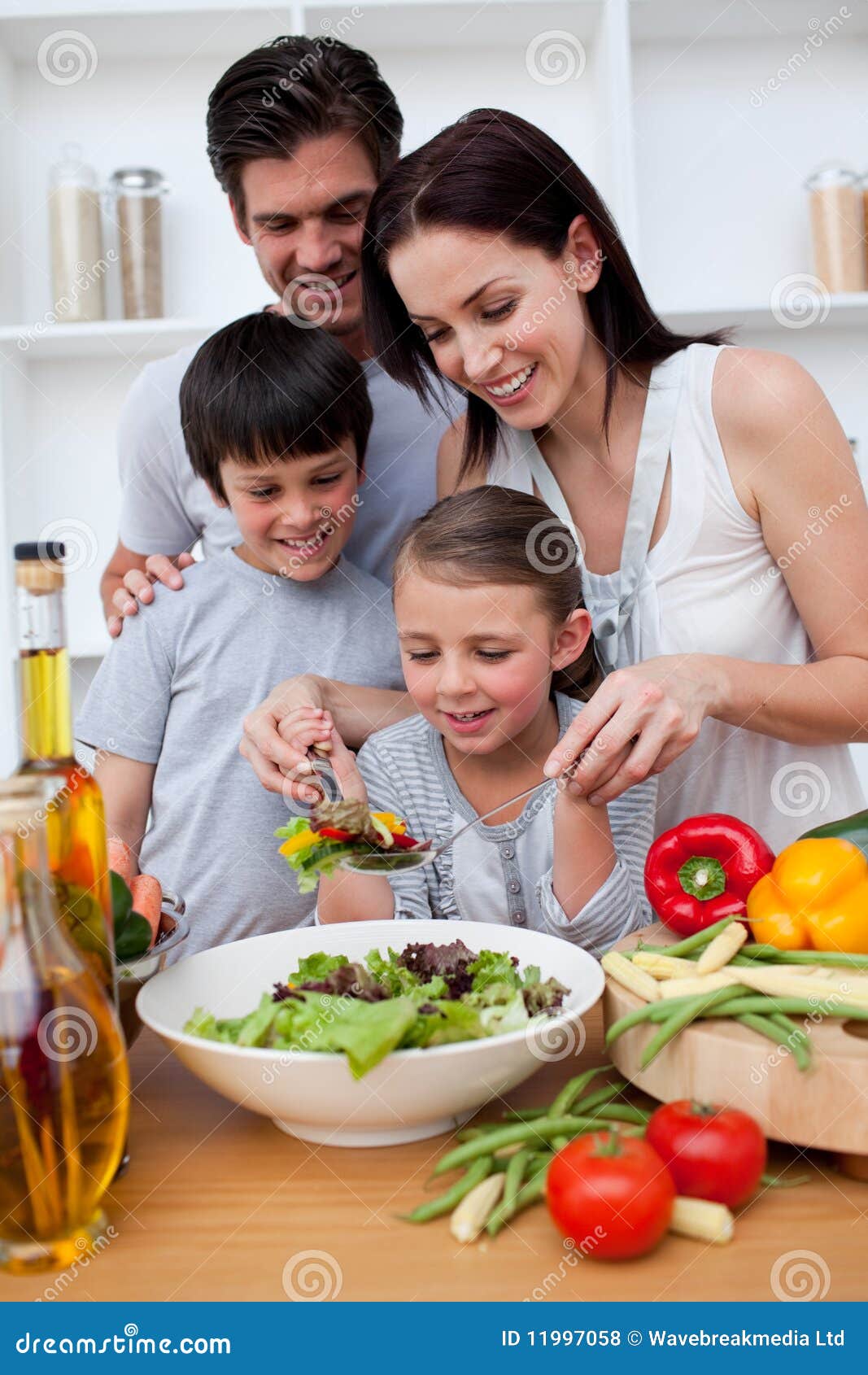 Happy Family Cooking Together Stock Photo - Image of family, happy ...