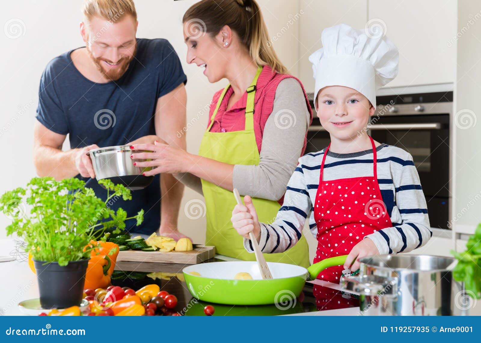 Family Cooking Together in Kitchen Stock Image - Image of eating ...