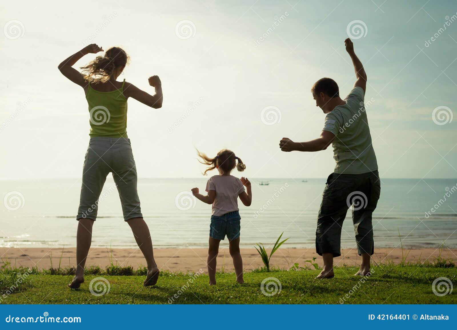 Happy Family Dancing the Beach Stock Image - Image of father, active ...