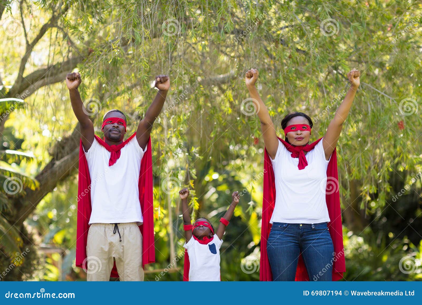 Happy family dressing up stock photo. Image of entertaining - 69807194