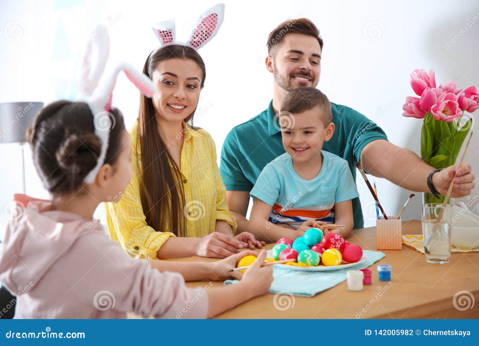 Happy Family with Easter Eggs at Home Stock Photo - Image of ears ...