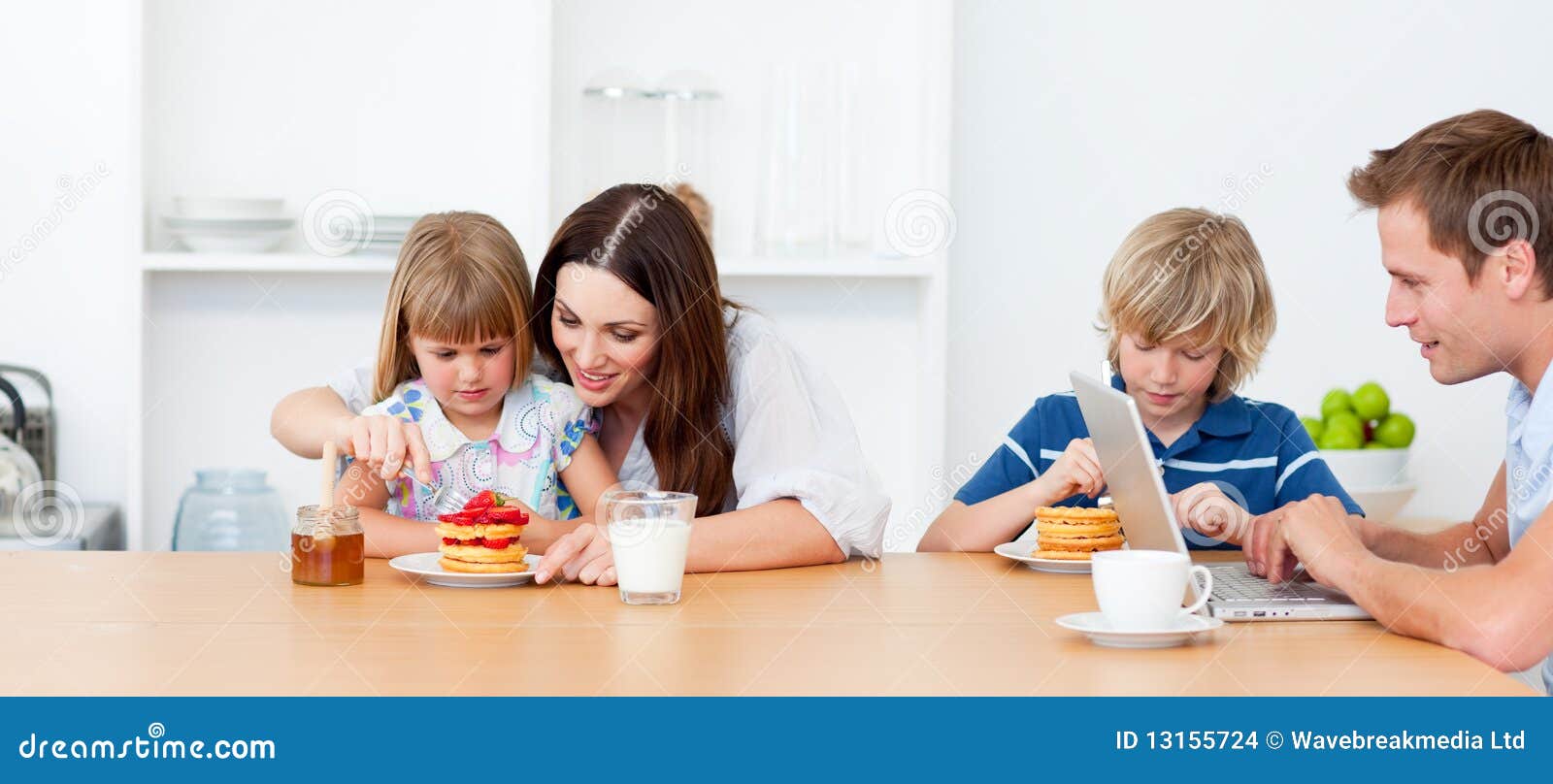 Happy Family Eating Breakfast in the Kitchen Stock Photo - Image of ...