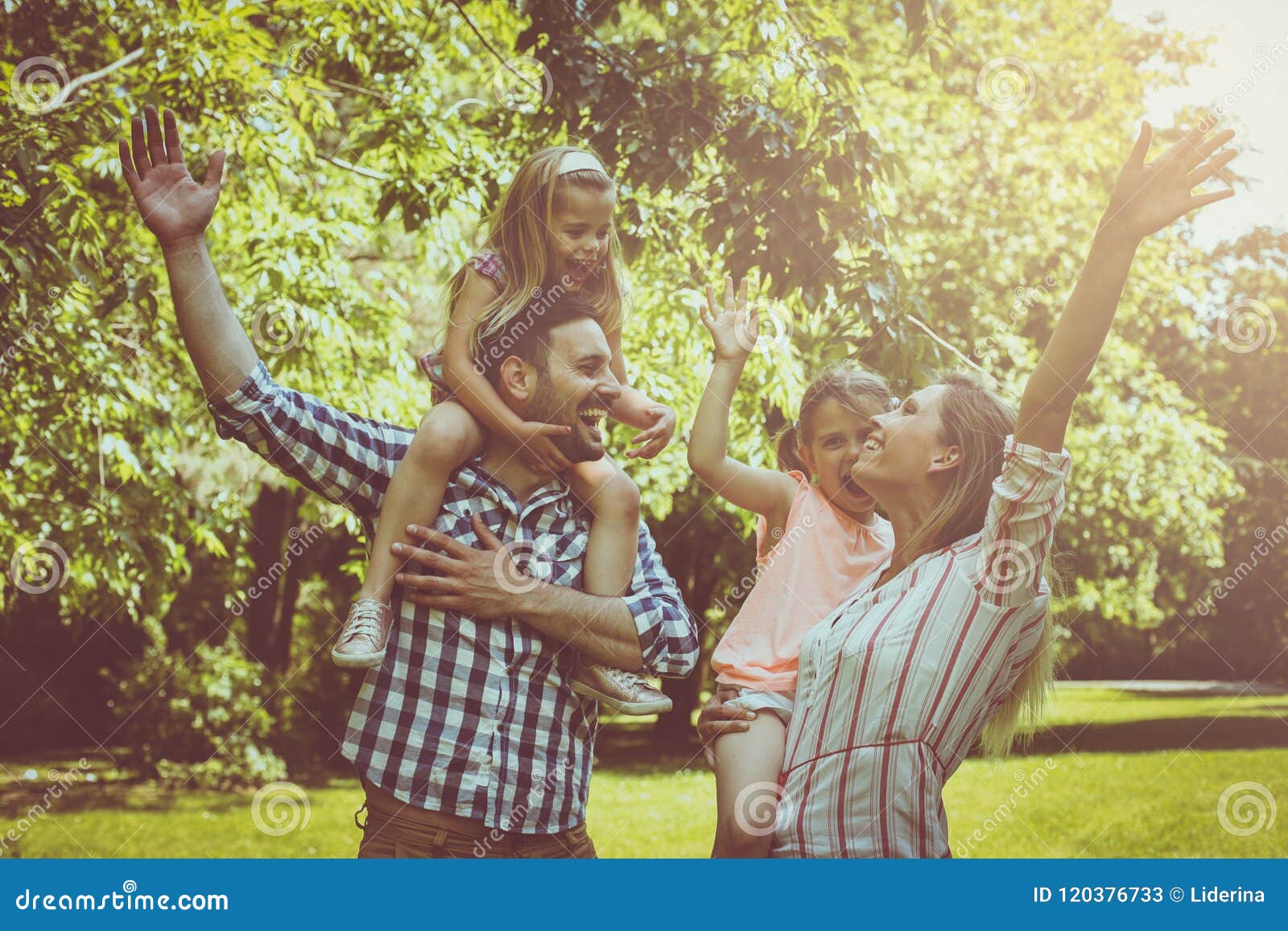 Happy Family Enjoying Together in Summer Day. Family in Nature Stock ... Happy Family Enjoying Together in Summer Day. Family in Nature Stock ...