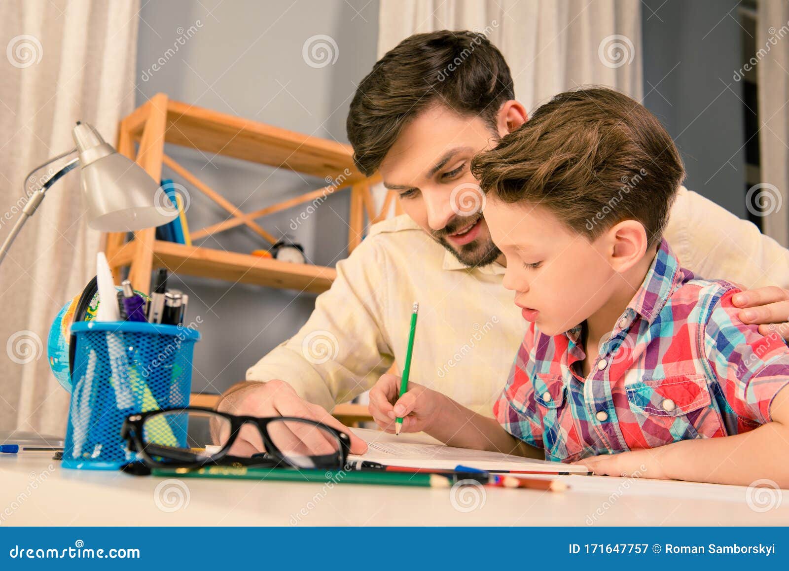 Happy Family. Father and Son Doing Homework Together Stock Image ...