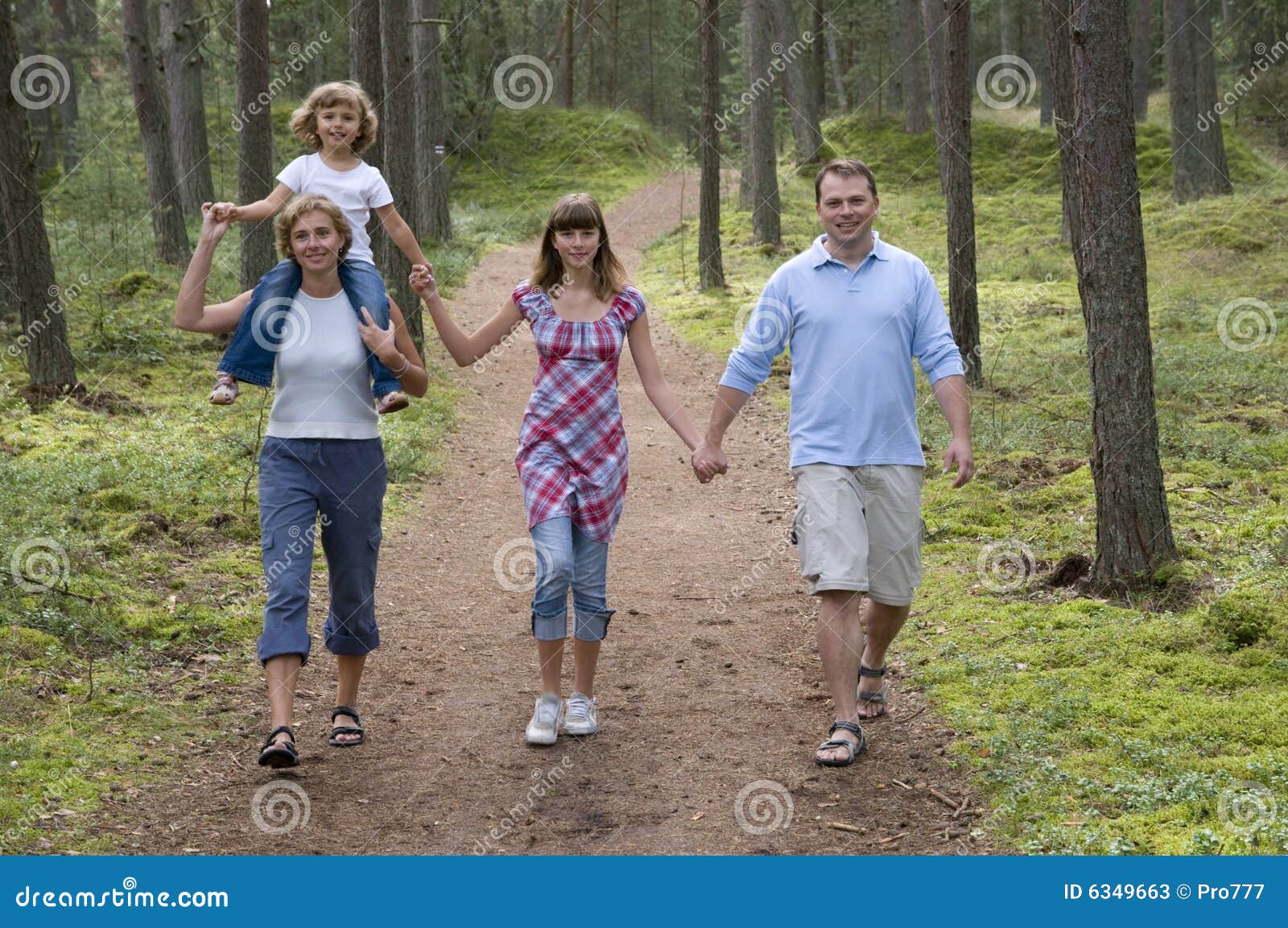 Happy family in the forest stock image. Image of full - 6349663