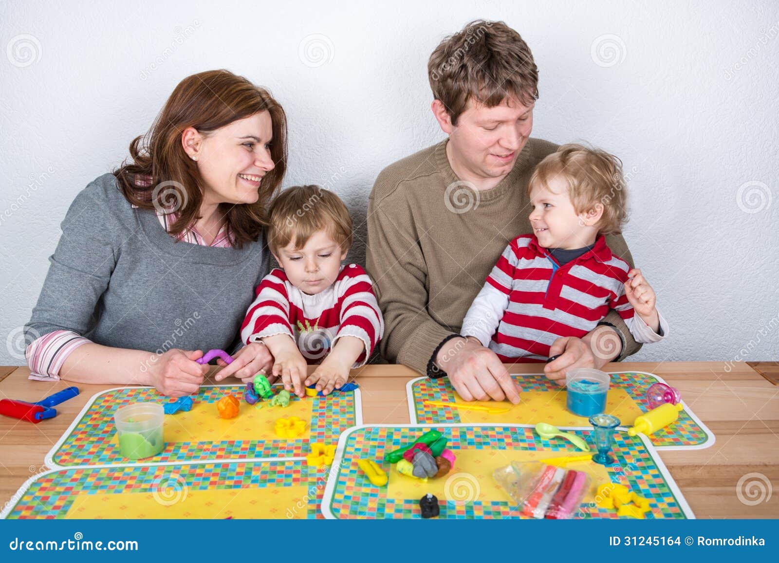 Happy Family of a Four Having Fun at Home Stock Photo - Image of ...