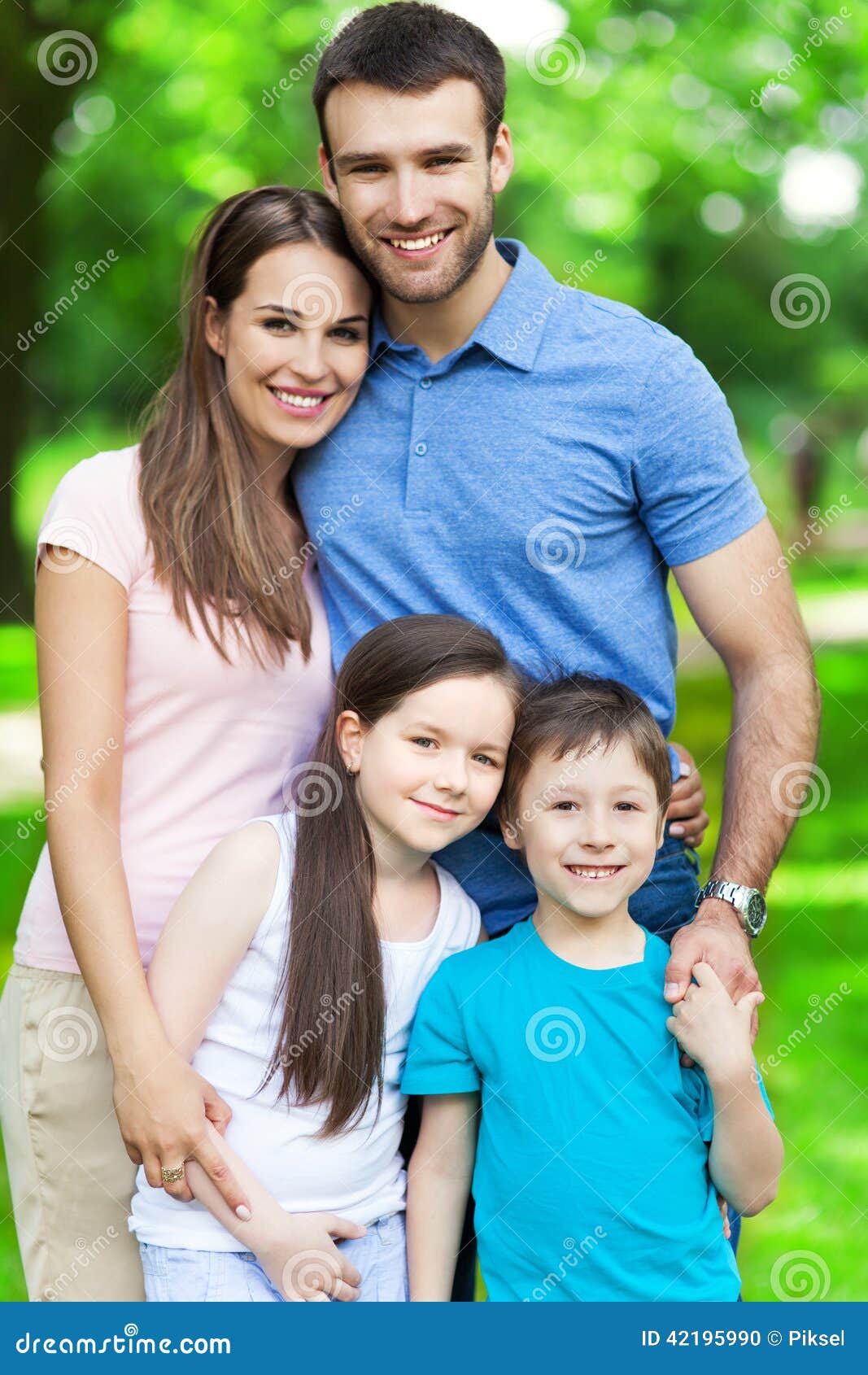 Happy family of four stock photo. Image of mother, parent - 42195990