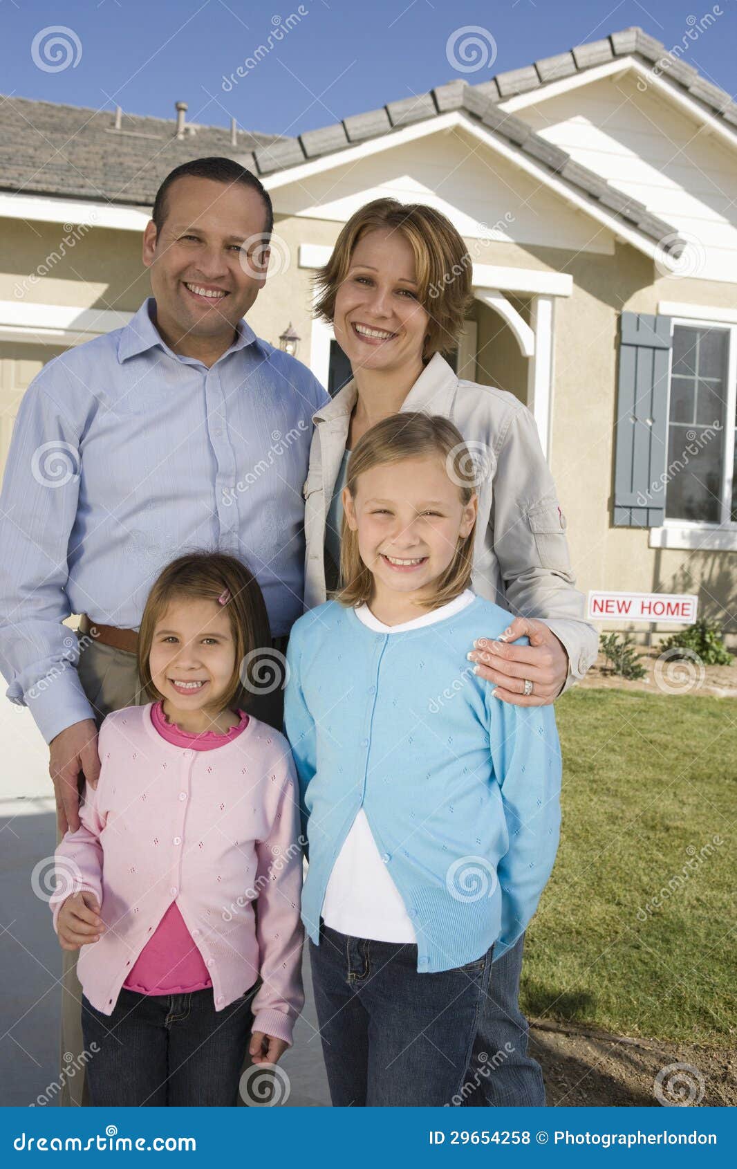 Happy Family in Front of New House Stock Photo - Image of daughter ...