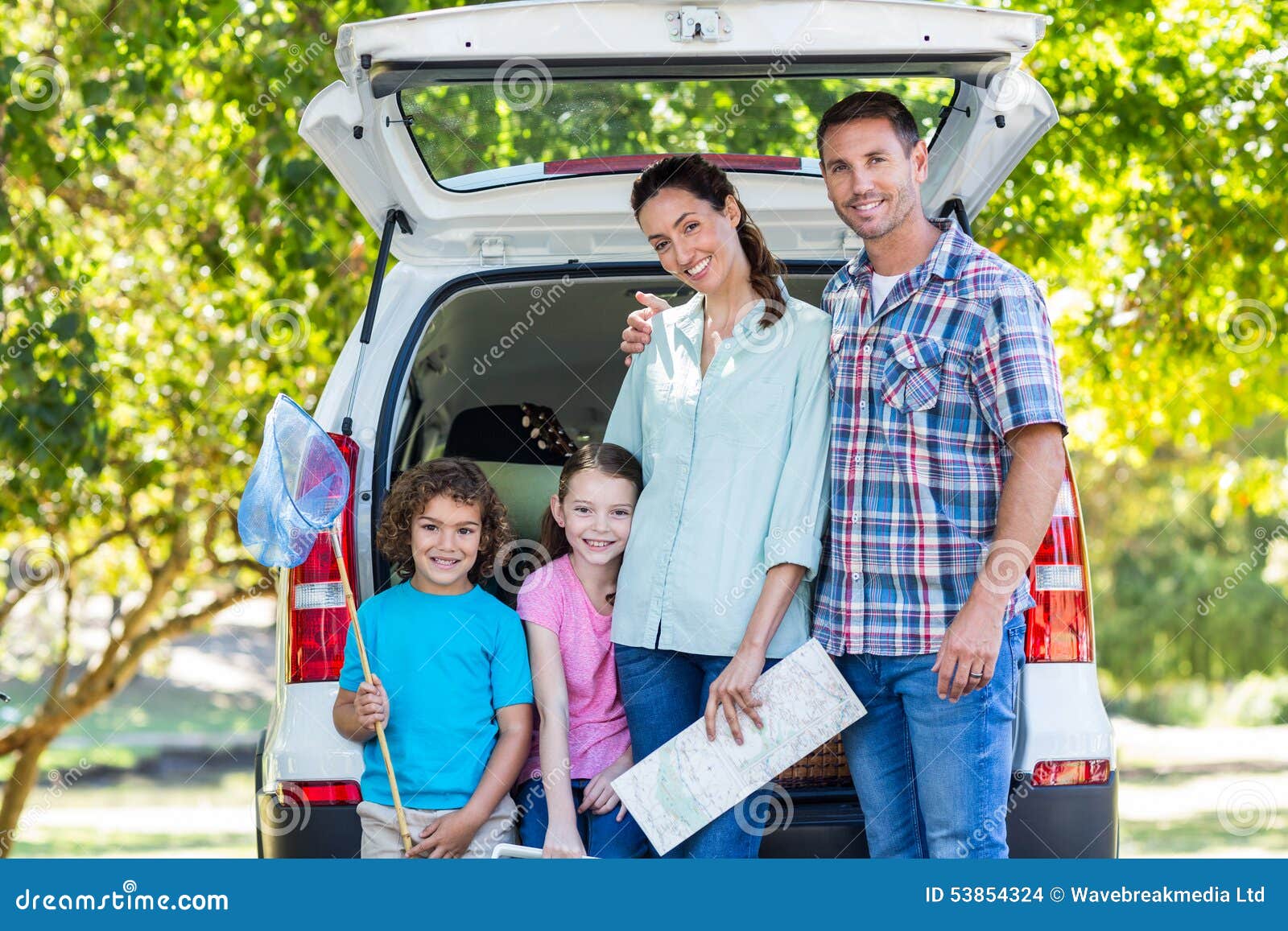 Happy Family Getting Ready for Road Trip Stock Photo - Image of ...
