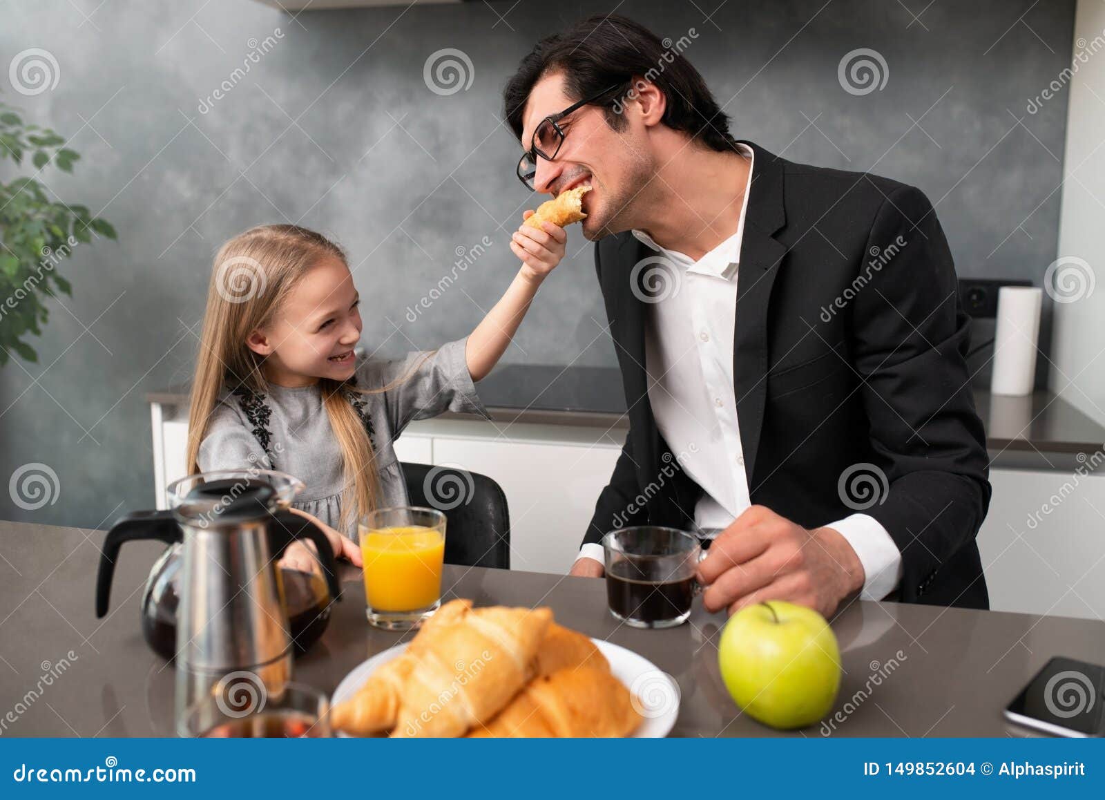 Happy Family Have a Breakfast at Home Stock Photo - Image of young ...
