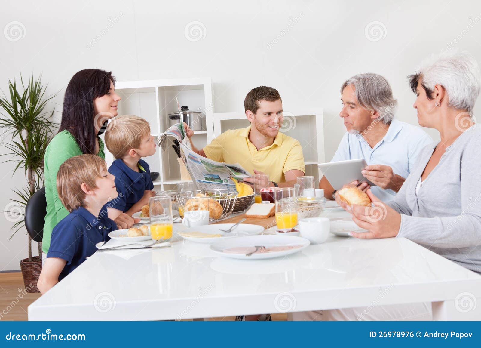 Happy Family Having Breakfast Together Stock Photo - Image of home ...