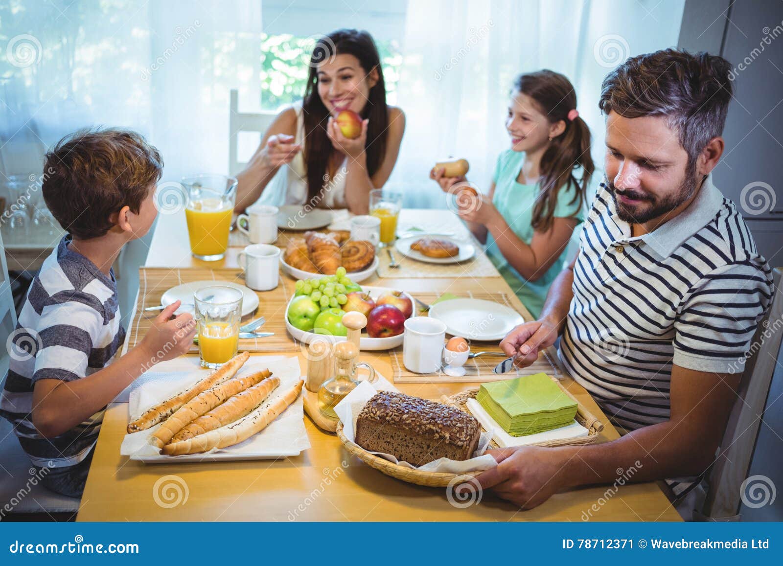 Happy Family Having Breakfast Together Stock Image - Image of apple ...