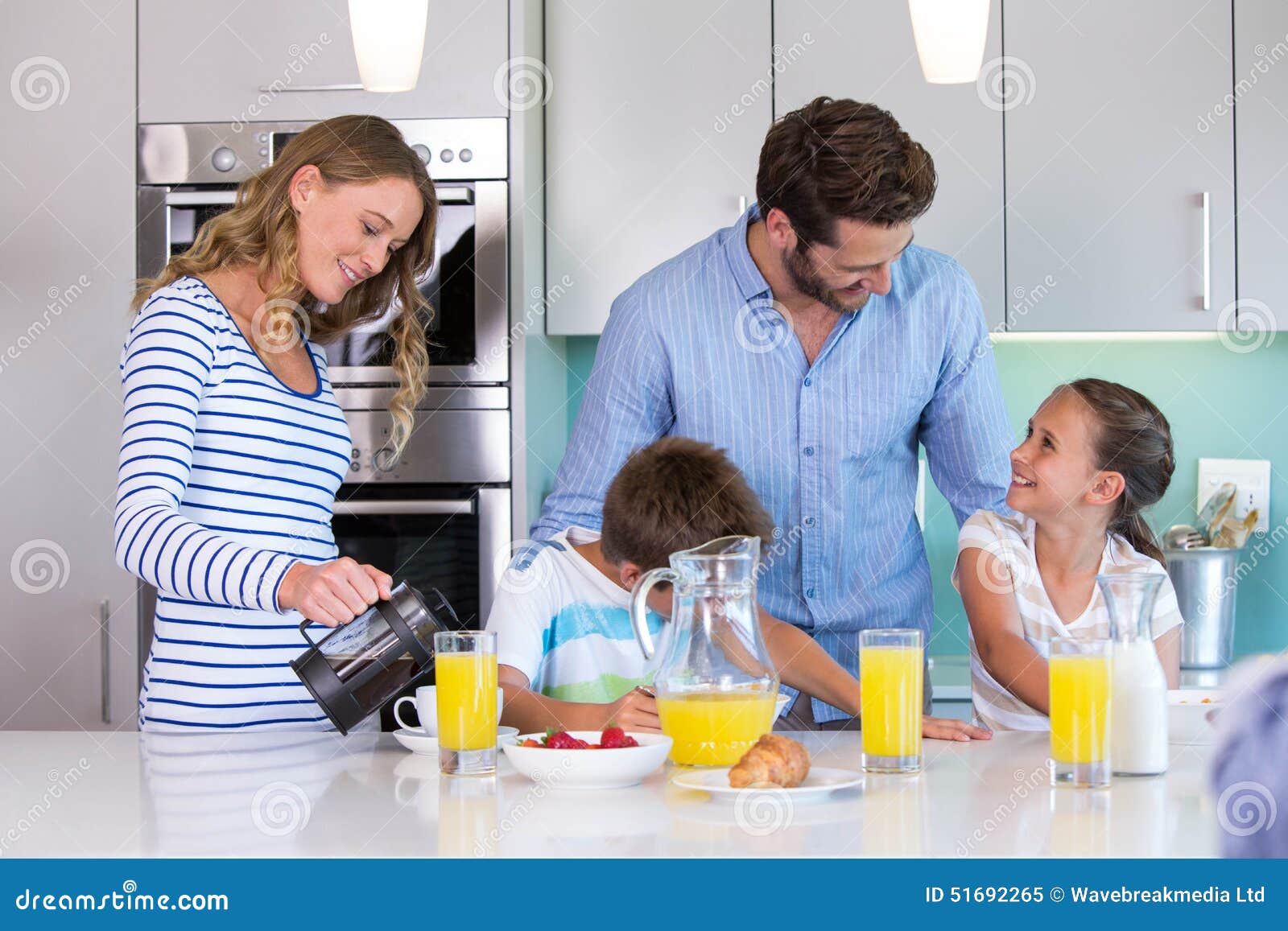 Happy Family Having Breakfast Together Stock Image - Image of family ...