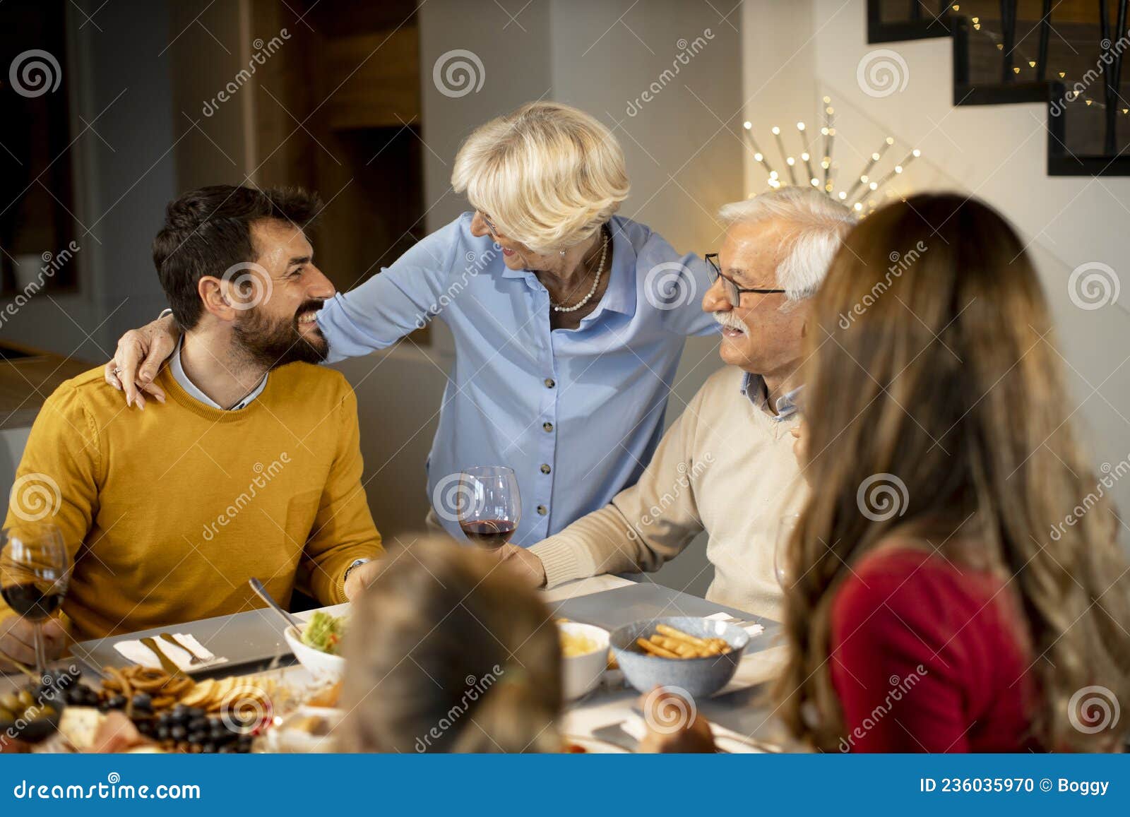 Happy Family Having Dinner with Red Wine at Home Stock Photo - Image of ...