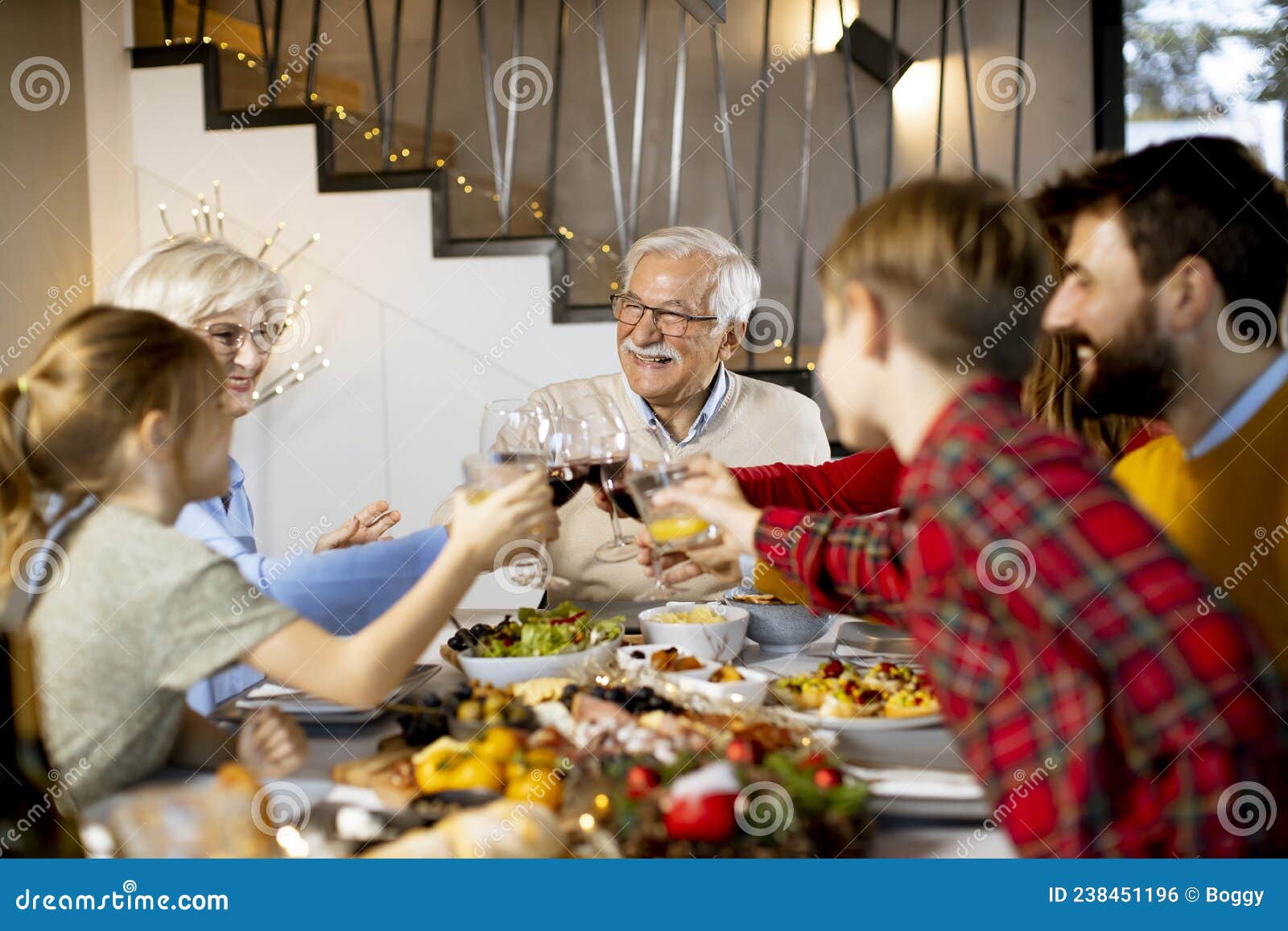 Happy Family Having Dinner with Red Wine at Home Stock Photo - Image of ...
