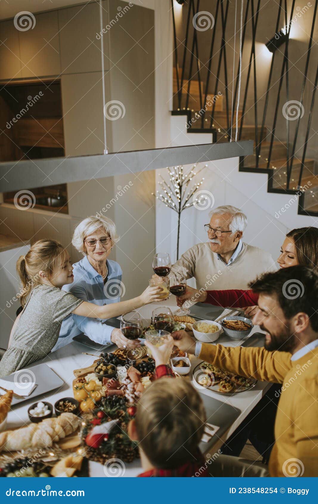 Happy Family Having Dinner with Red Wine at Home Stock Photo - Image of ...