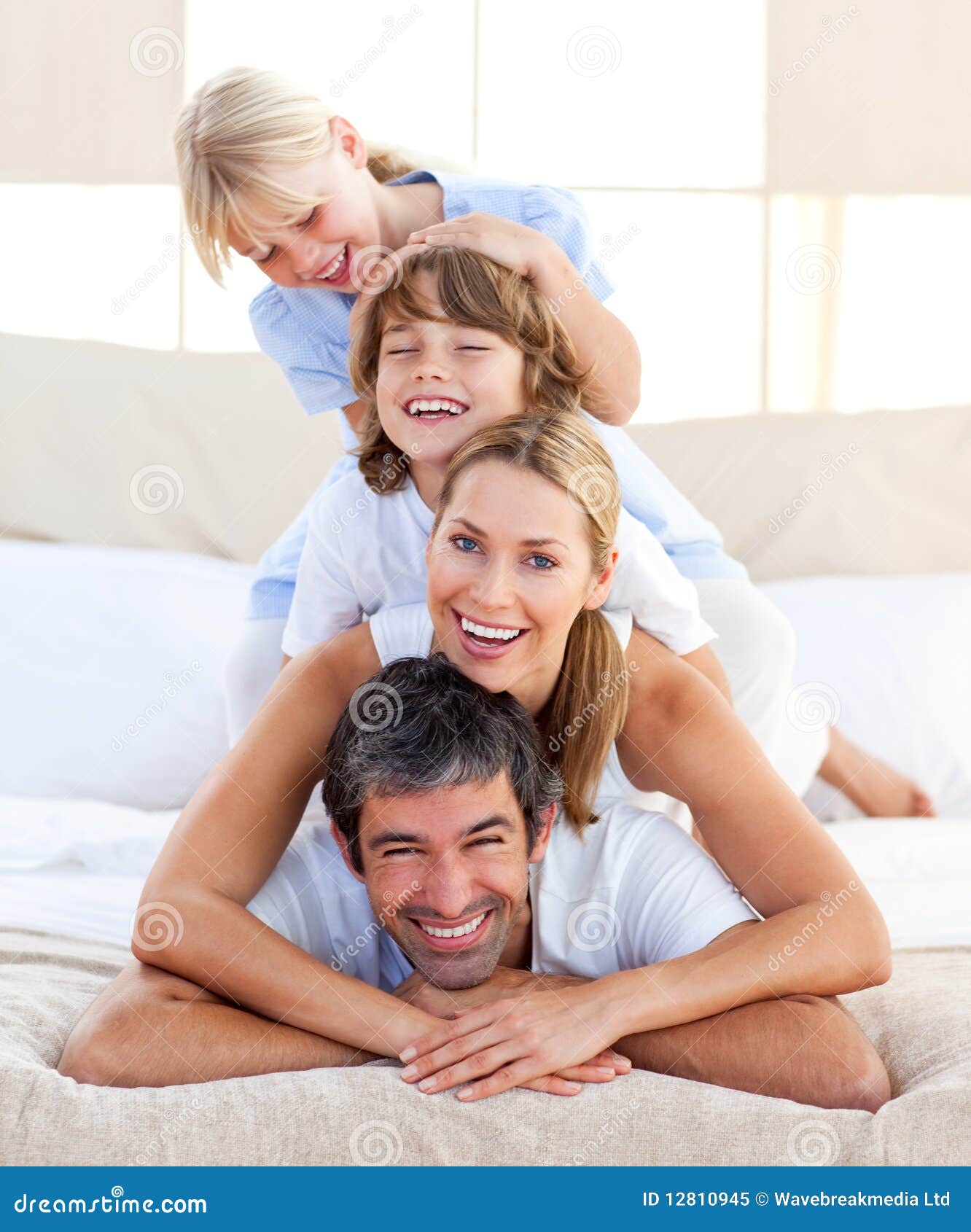 Happy family having fun stock image. Image of indoor - 12810945