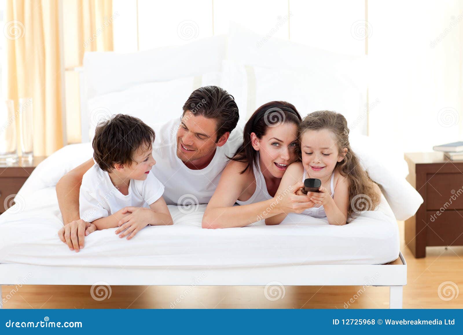 Happy Family Having Fun in the Bedroom Stock Photo - Image of human ...