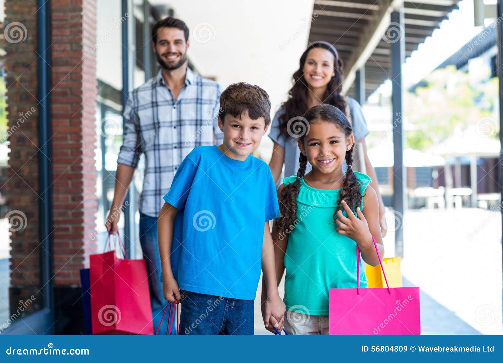 Happy Family Having Fun in the Mall Stock Image - Image of female, male ...