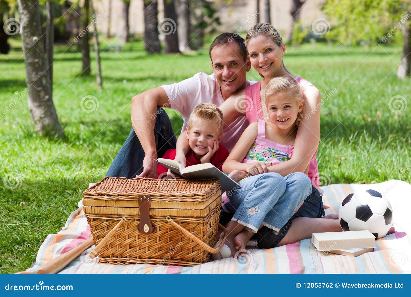 Happy Family Having Fun in a Park Stock Photo - Image of picnic ...