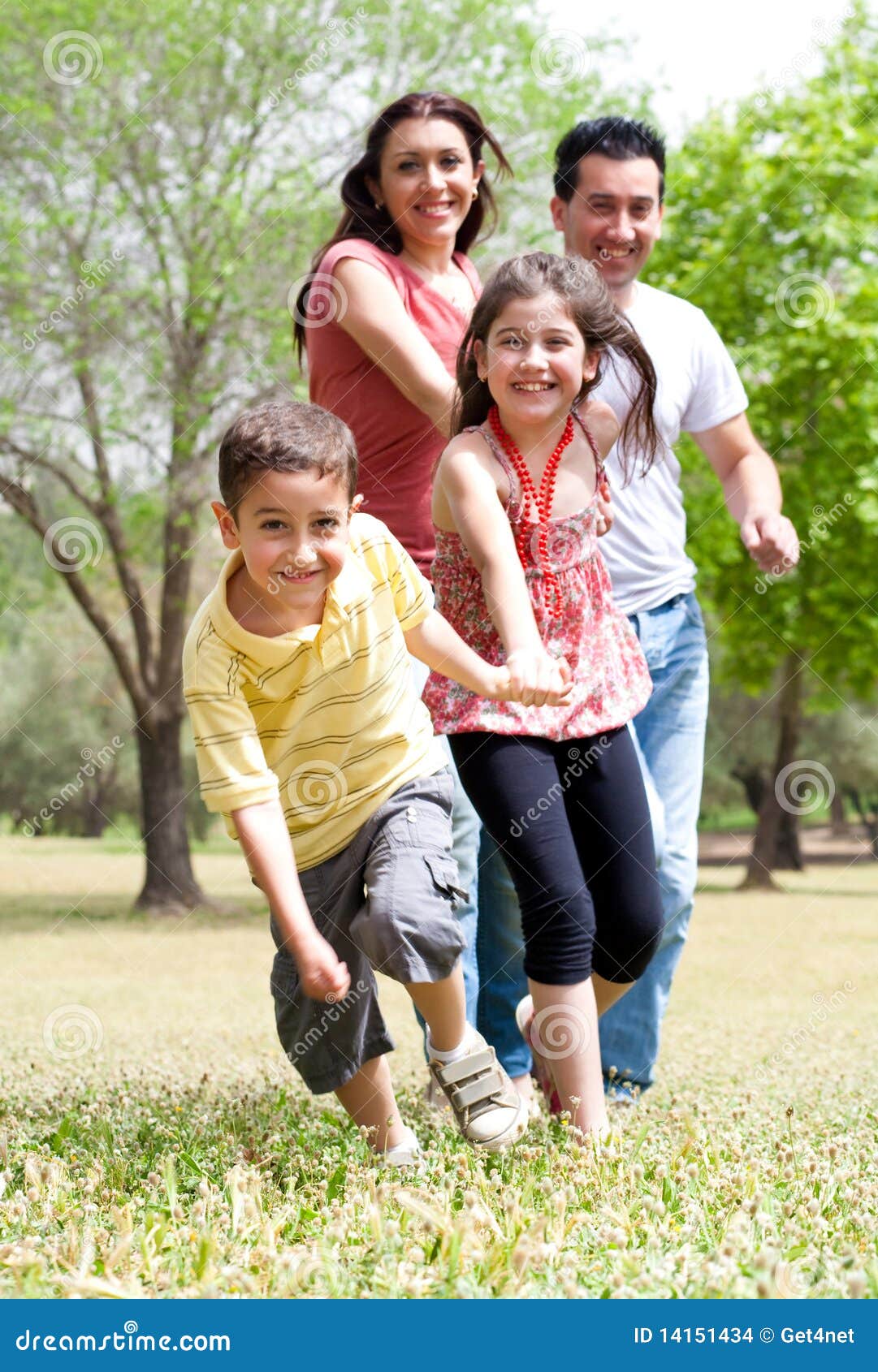 Happy Family Having Fun in the Park Stock Photo - Image of family ...