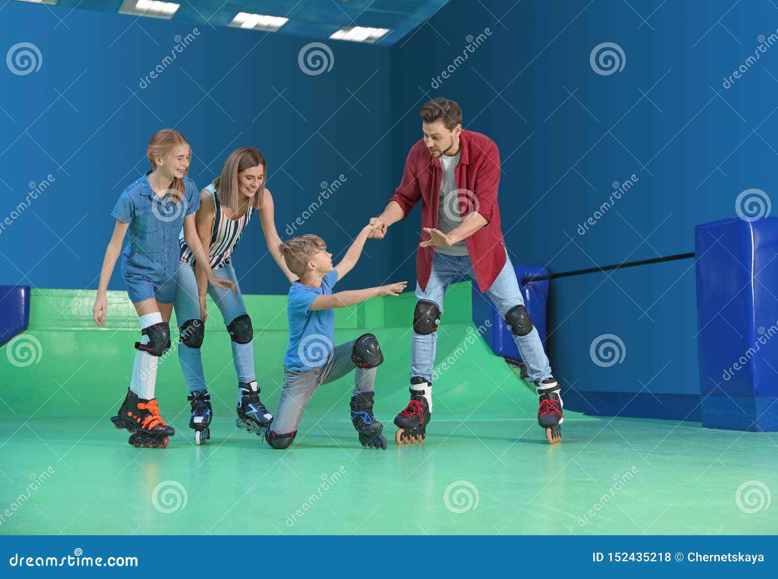 Family Having Fun at Roller Skating Rink Stock Photo - Image of indoors ...