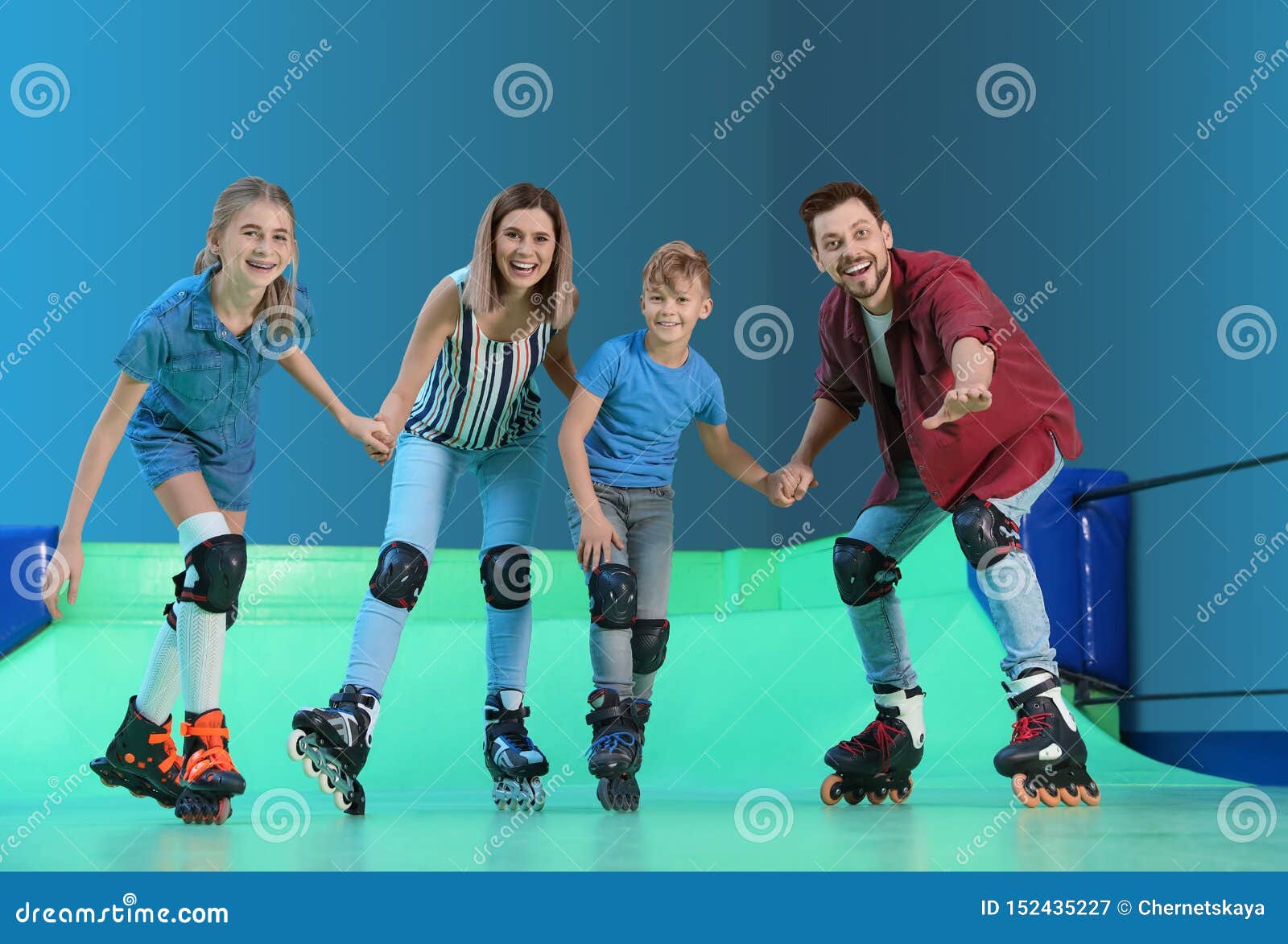 Happy Family Having Fun at Roller Rink Stock Image - Image of daughter ...