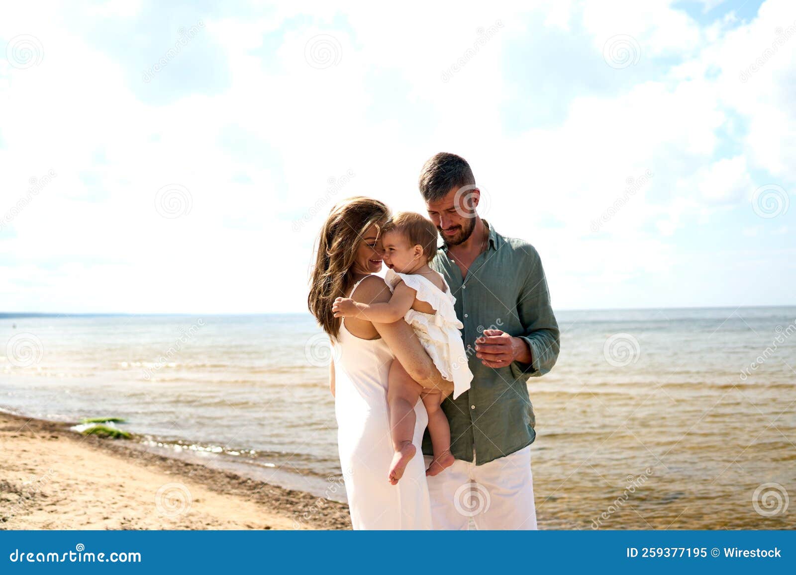 Happy Family Having Fun Together at the Beach Stock Image - Image of ...