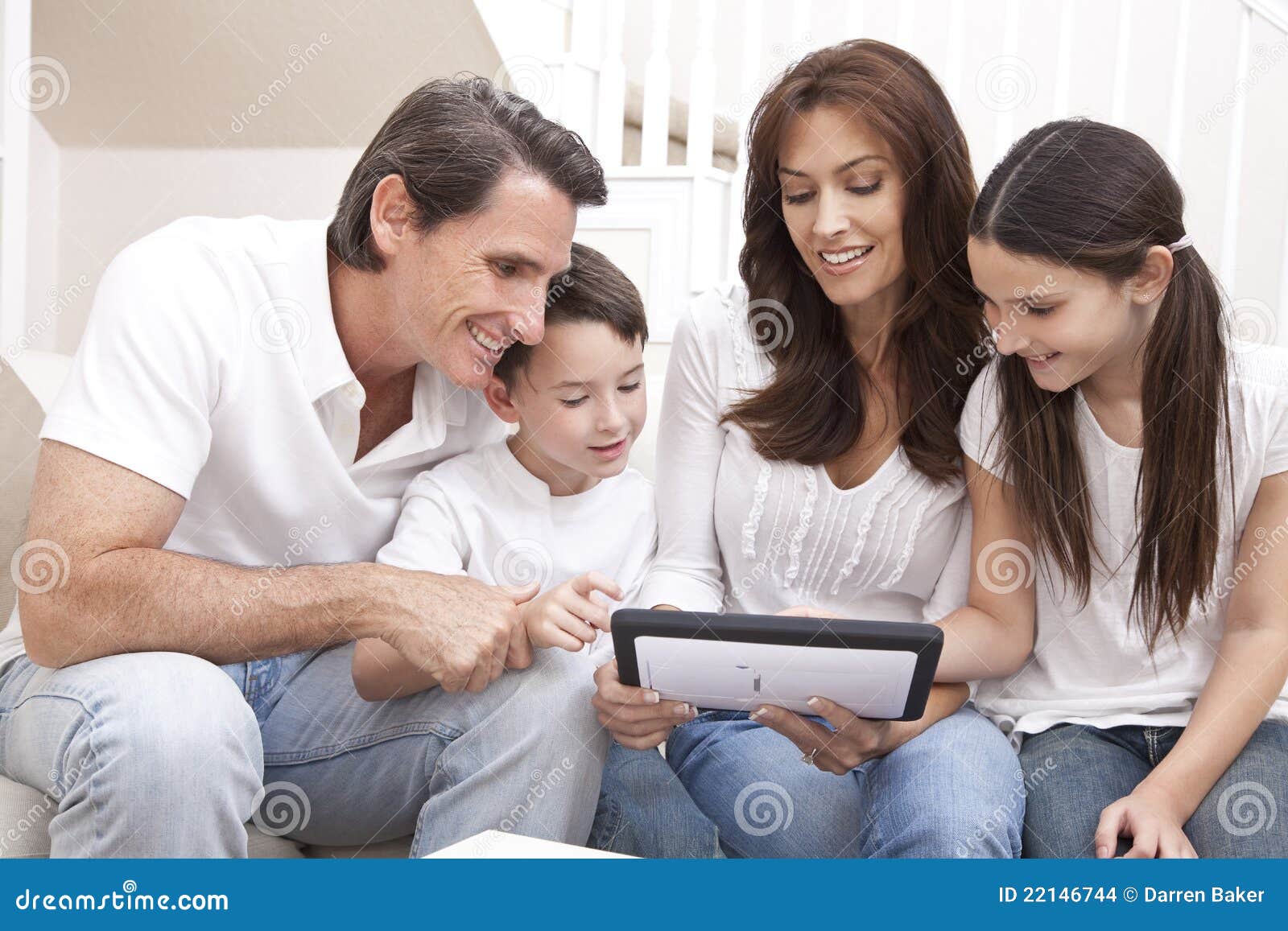 Happy Family Having Fun Using Tablet Computer Stock Photo - Image of ...