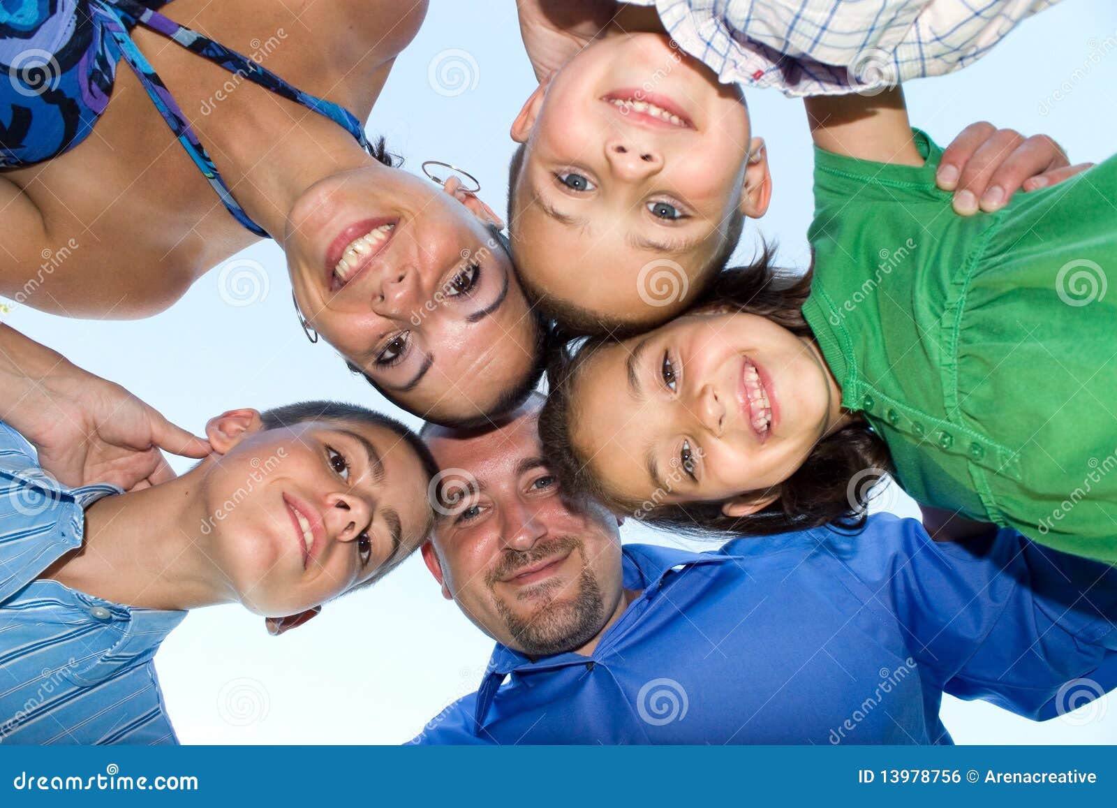 Happy Family Huddle stock photo. Image of happiness, children - 13978756
