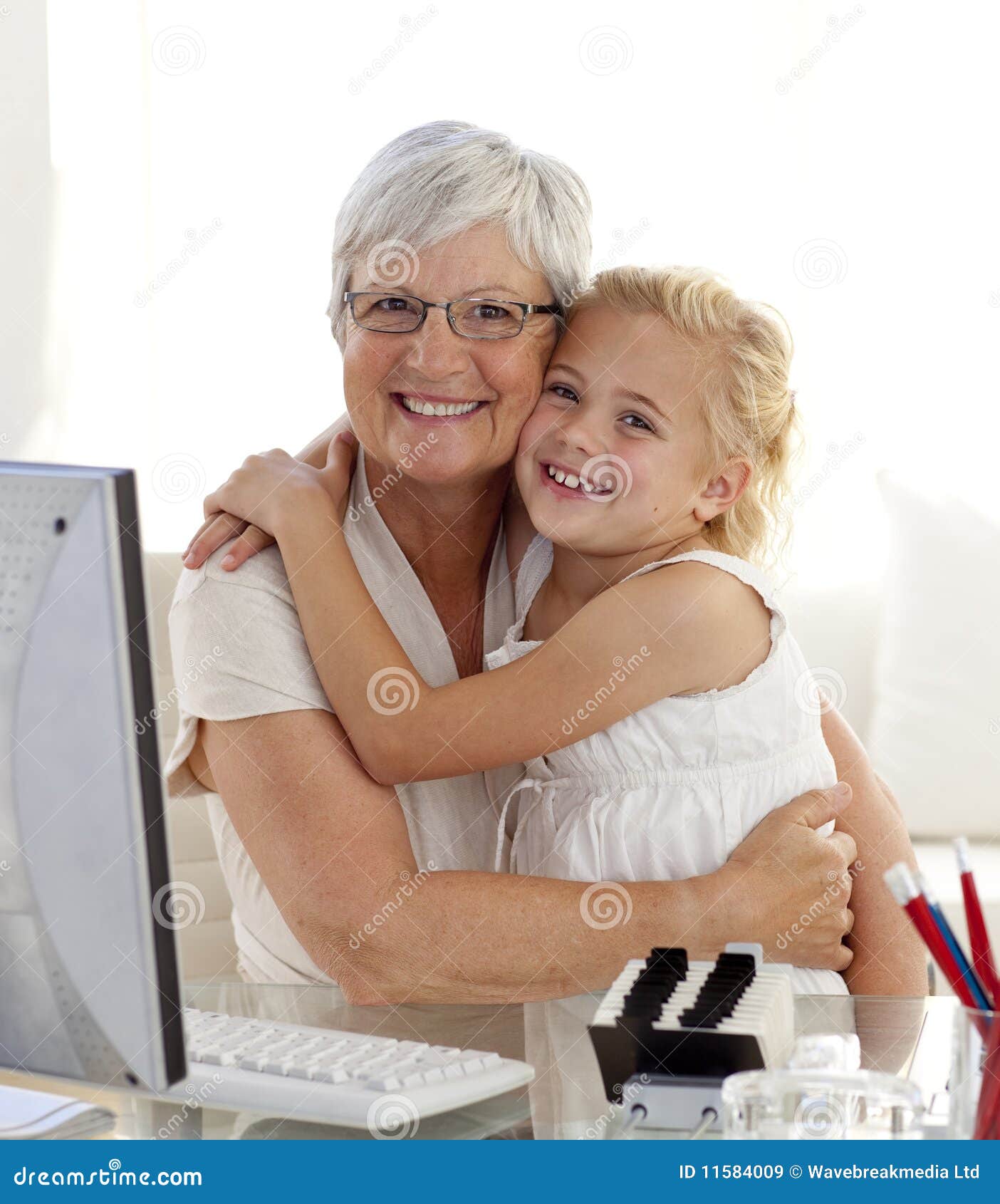 Happy Family Hugging and Computing Stock Image - Image of female ...