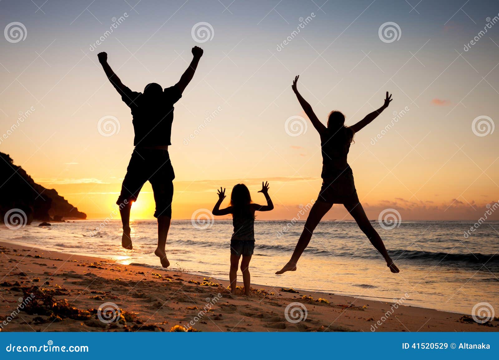 Happy Family Jumping at the Beach Stock Image - Image of holiday ...