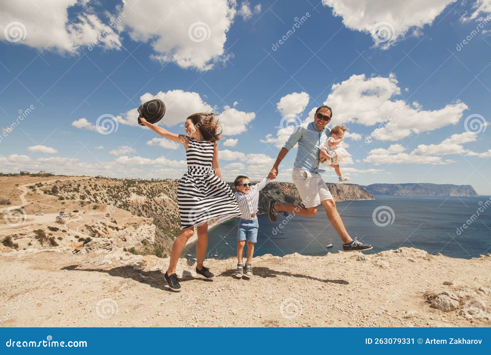 Happy Family Jumping Up Simultaneously. Stock Image - Image of couple ...
