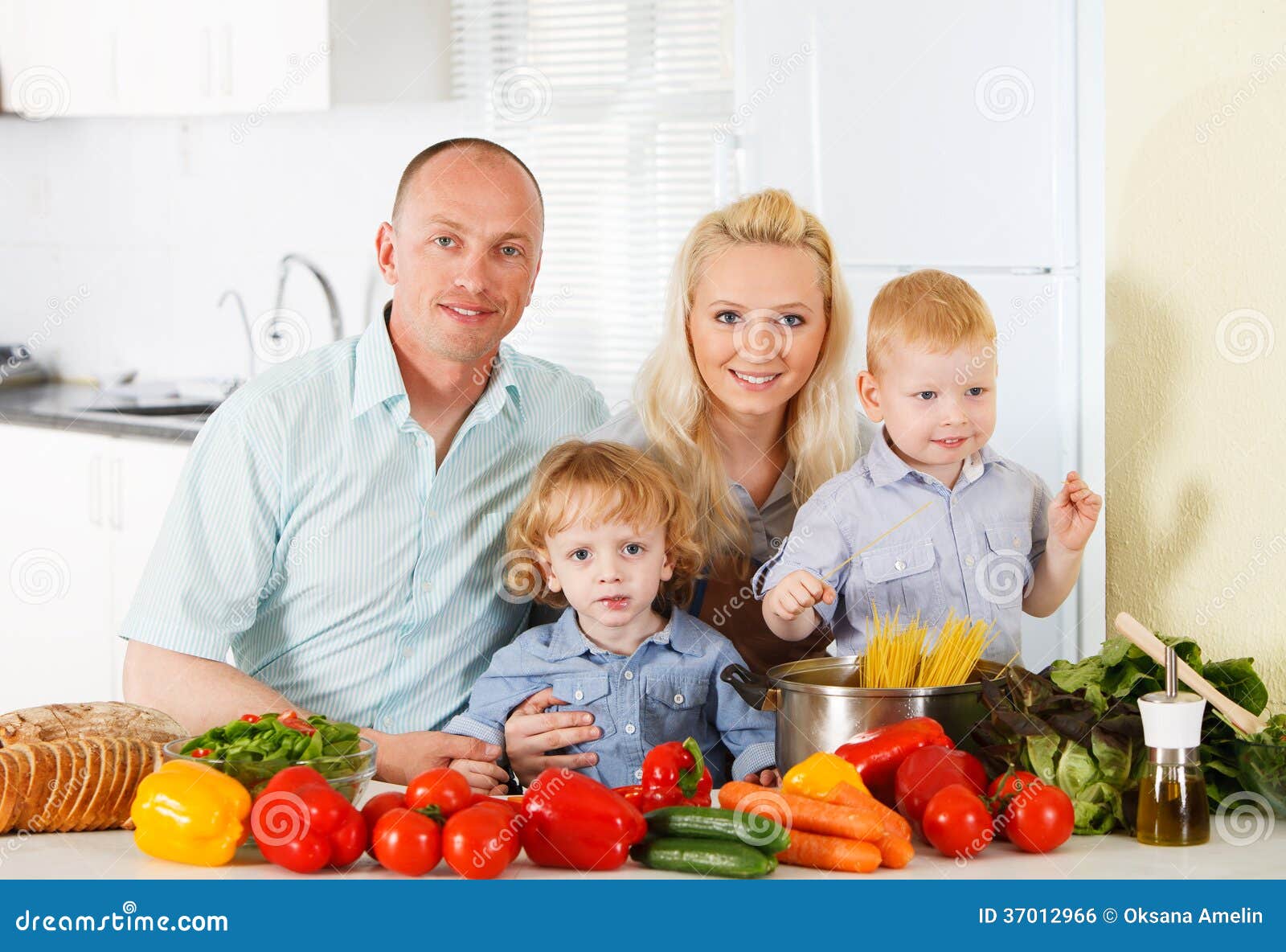 Happy family at kitchen. stock photo. Image of freshness - 37012966