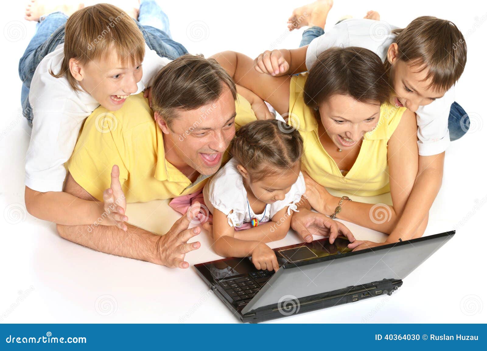 Happy family with laptop stock photo. Image of brother - 40364030