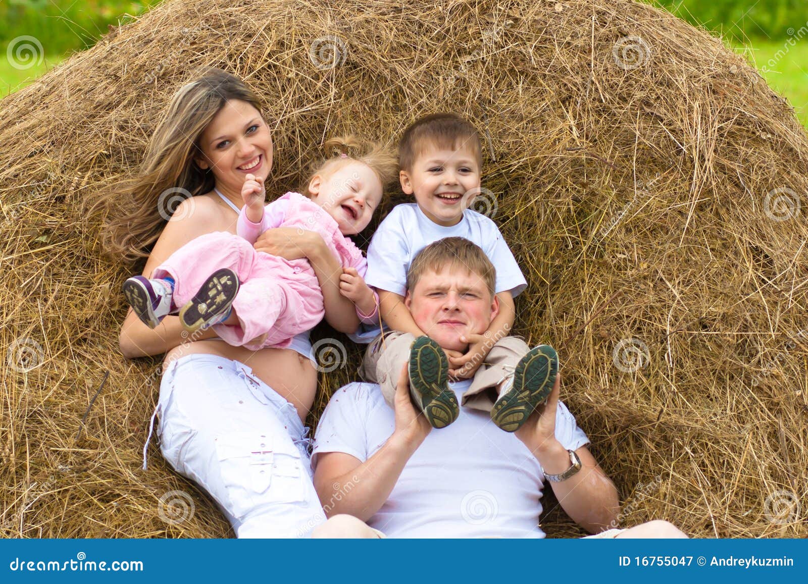 Happy Family Lying on Haystack in Summer Stock Image - Image of ...