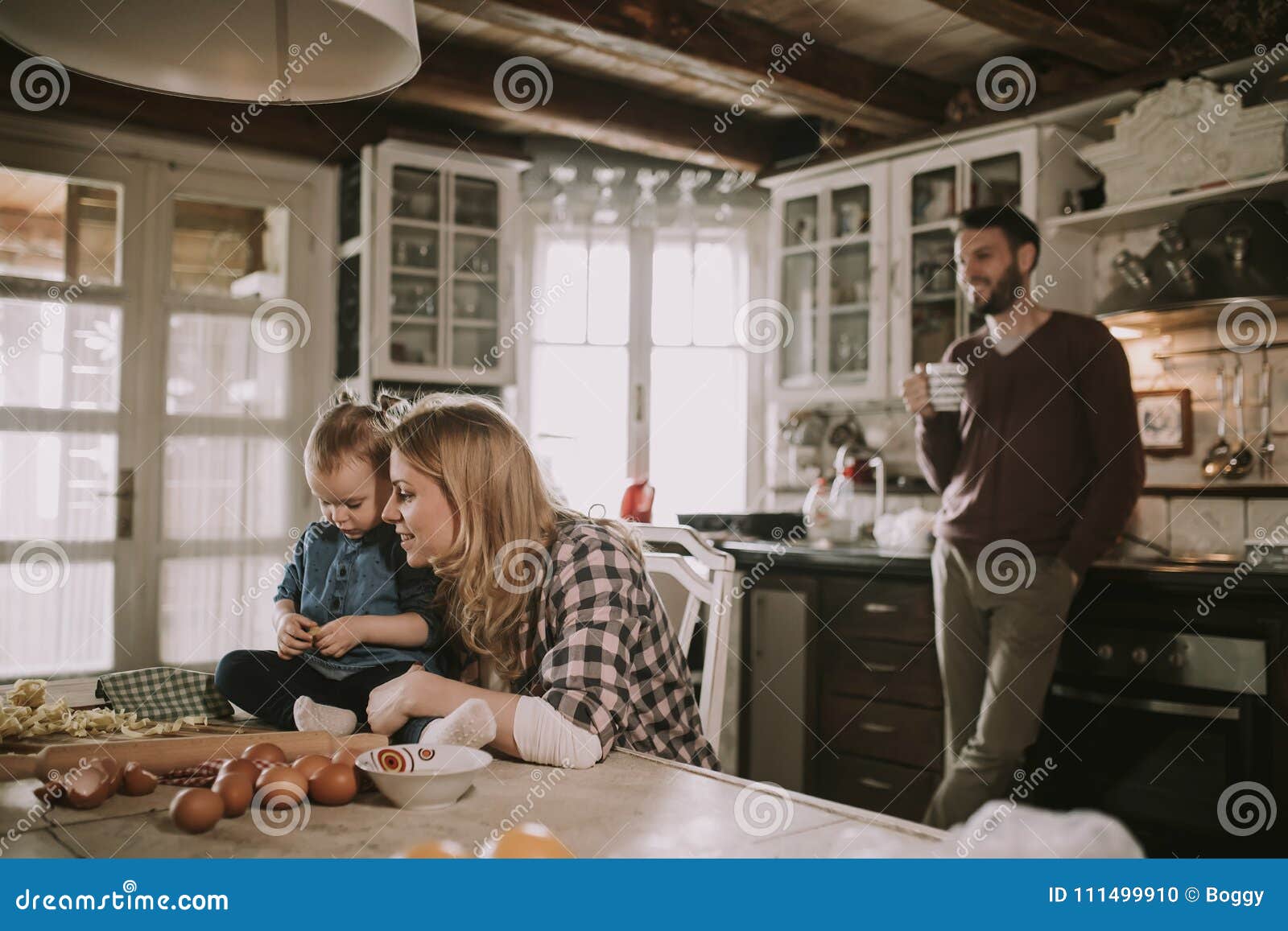 Happy Family Making Pasta in the Kitchen at Home Stock Photo - Image of ...