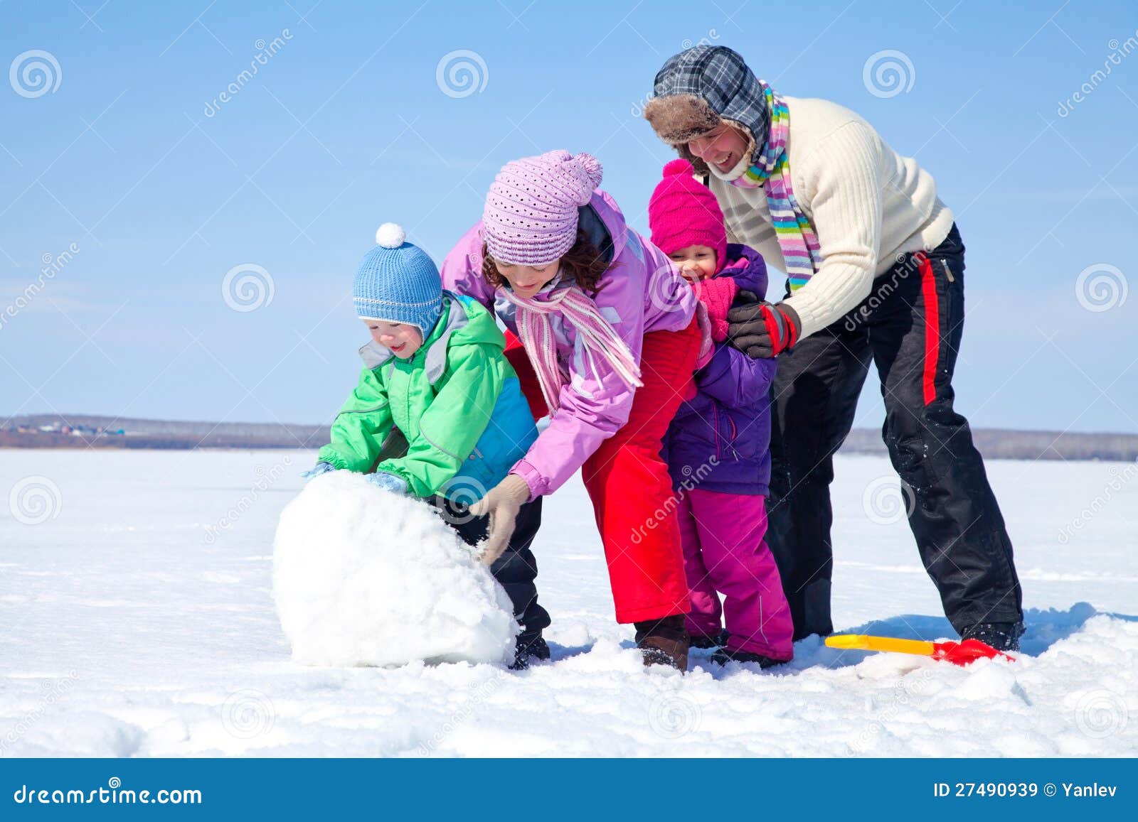 Happy Family Making Snowman Stock Image - Image of friendship ...