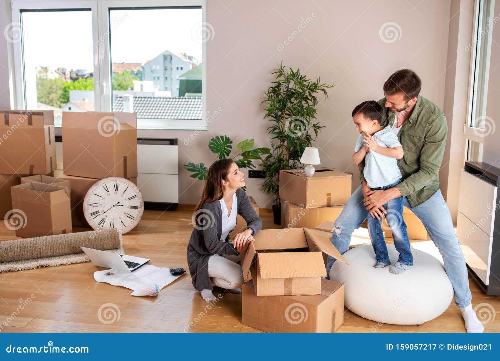 Happy Family Moving in and Having Fun Stock Image - Image of indoors ...