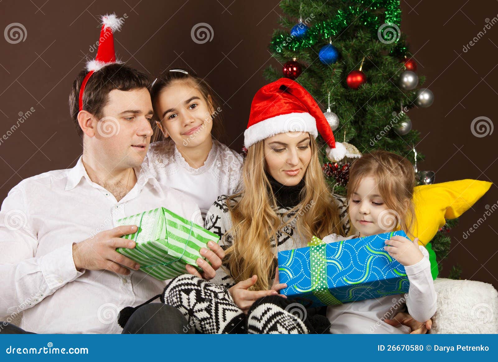 Happy Family Near the Christmas Tree Stock Photo - Image of home ...