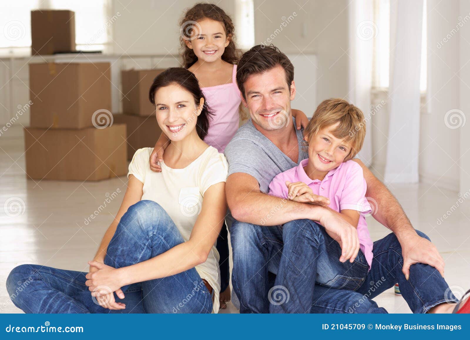 Happy family in new home stock image. Image of father - 21045709