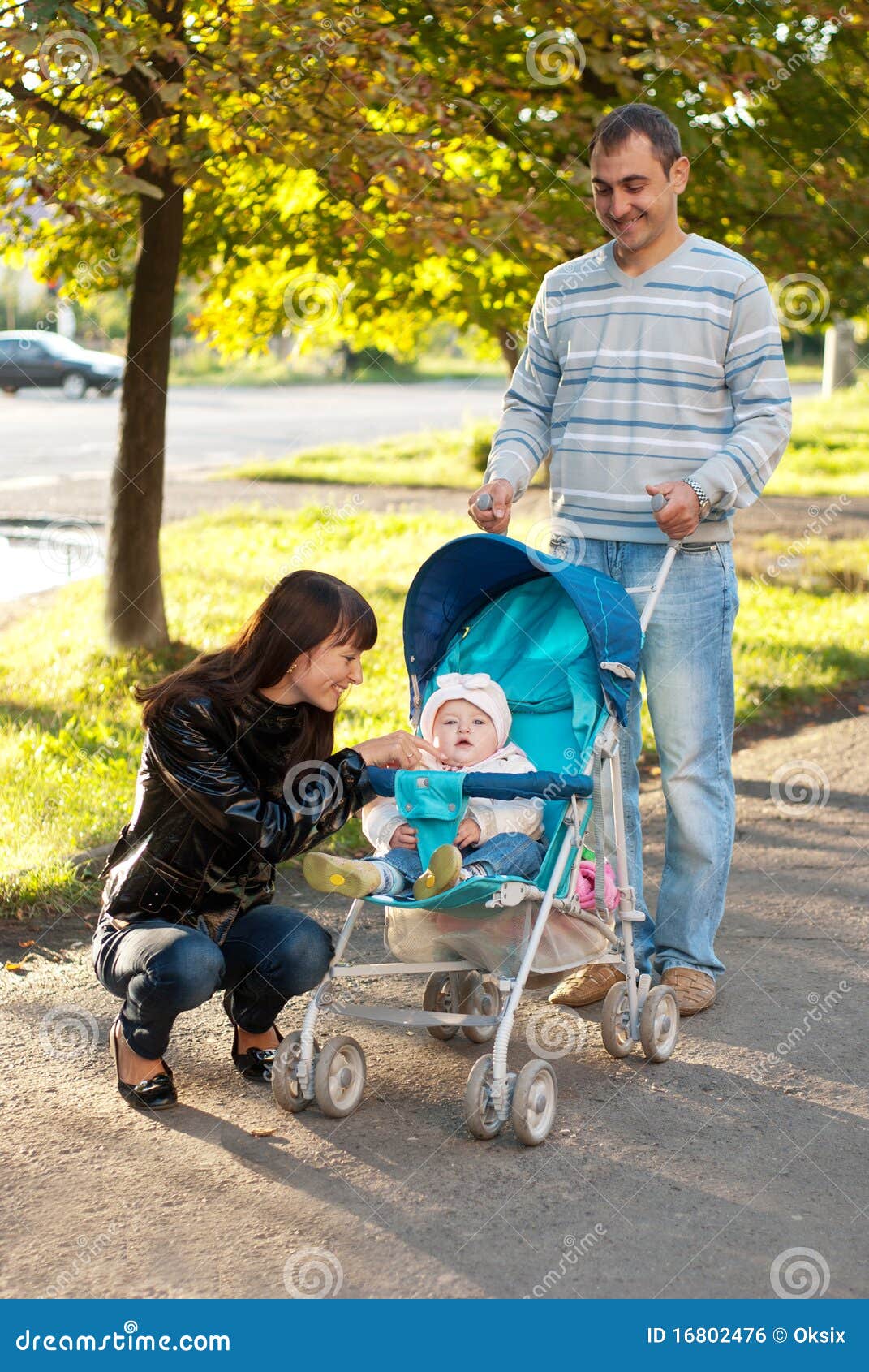 Young Couple Pushing Stroller Park Talking Stock Photos - Free ...