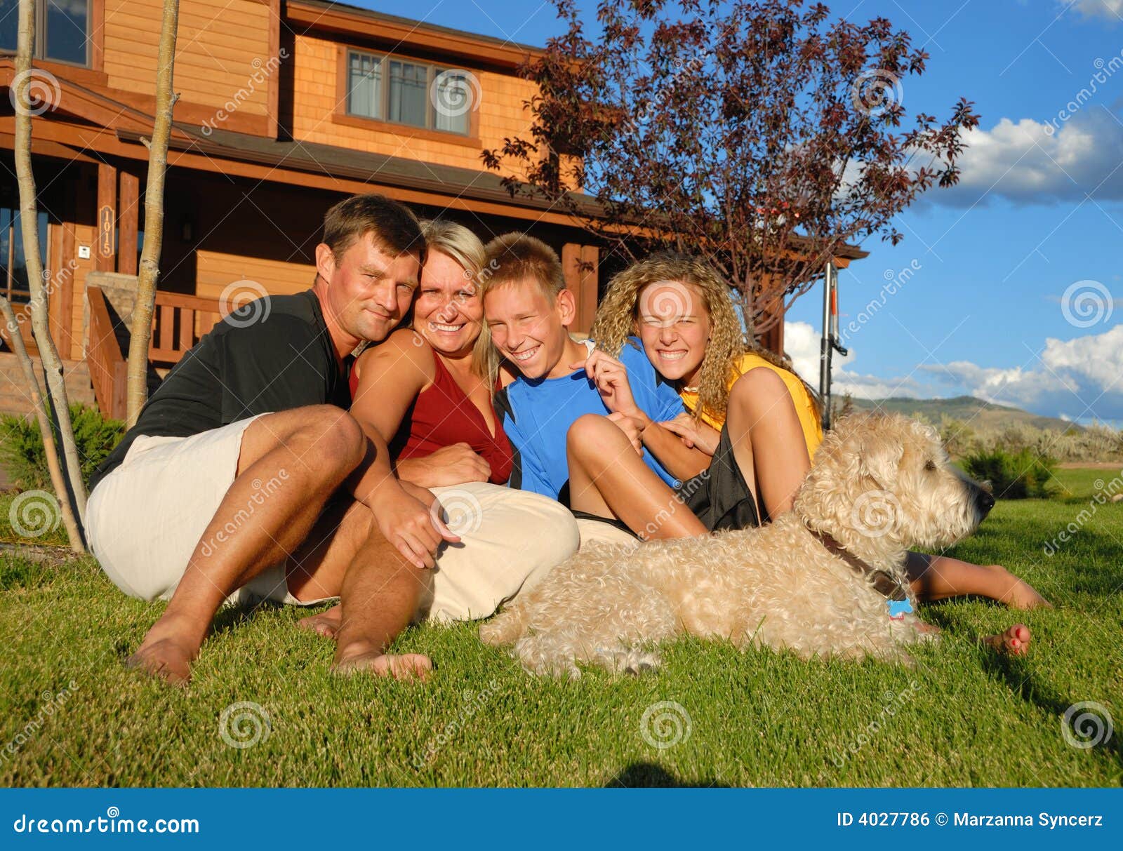 Happy family outside house stock photo. Image of colorful - 4027786