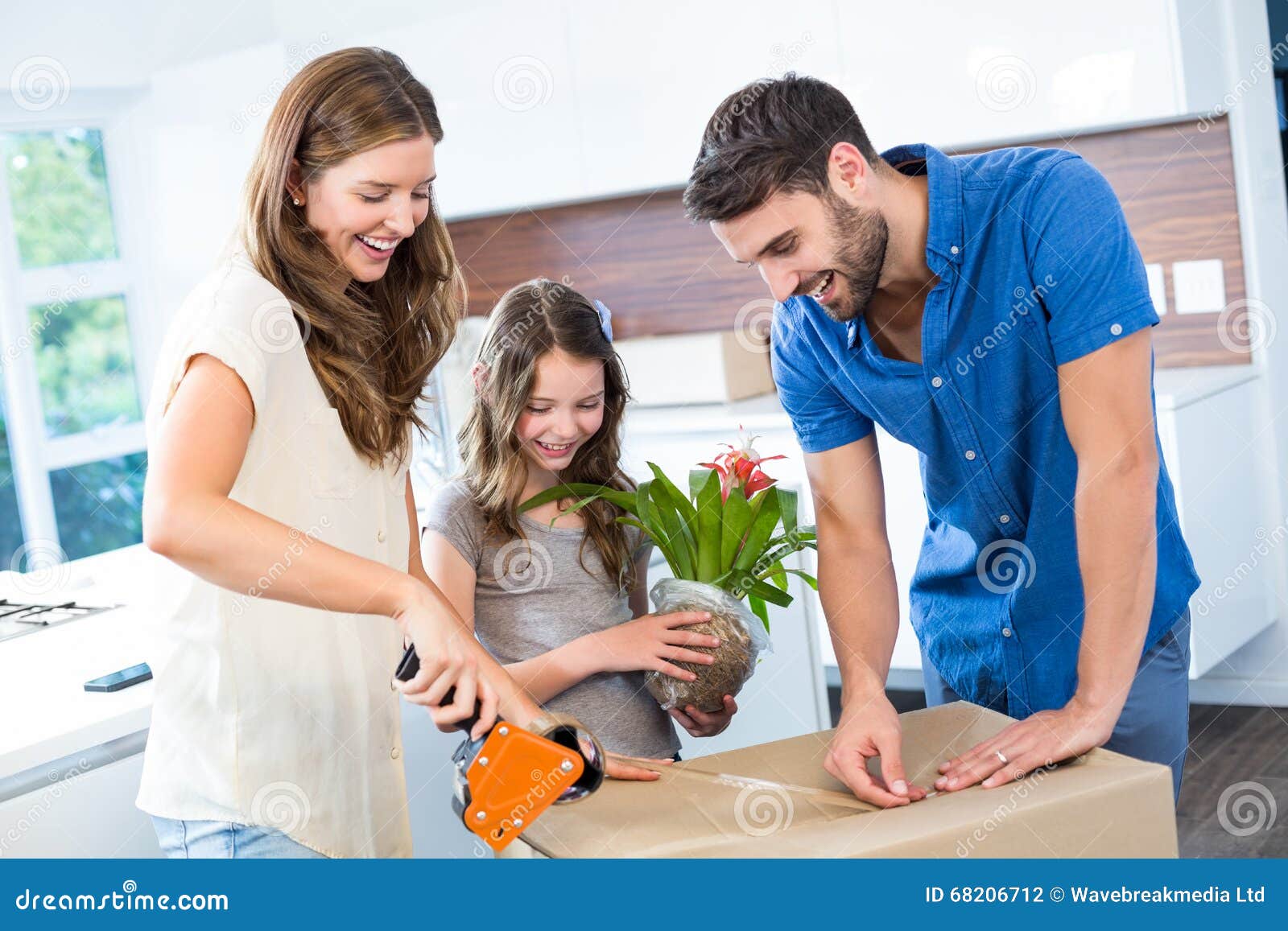 Happy family packing box stock photo. Image of family - 68206712