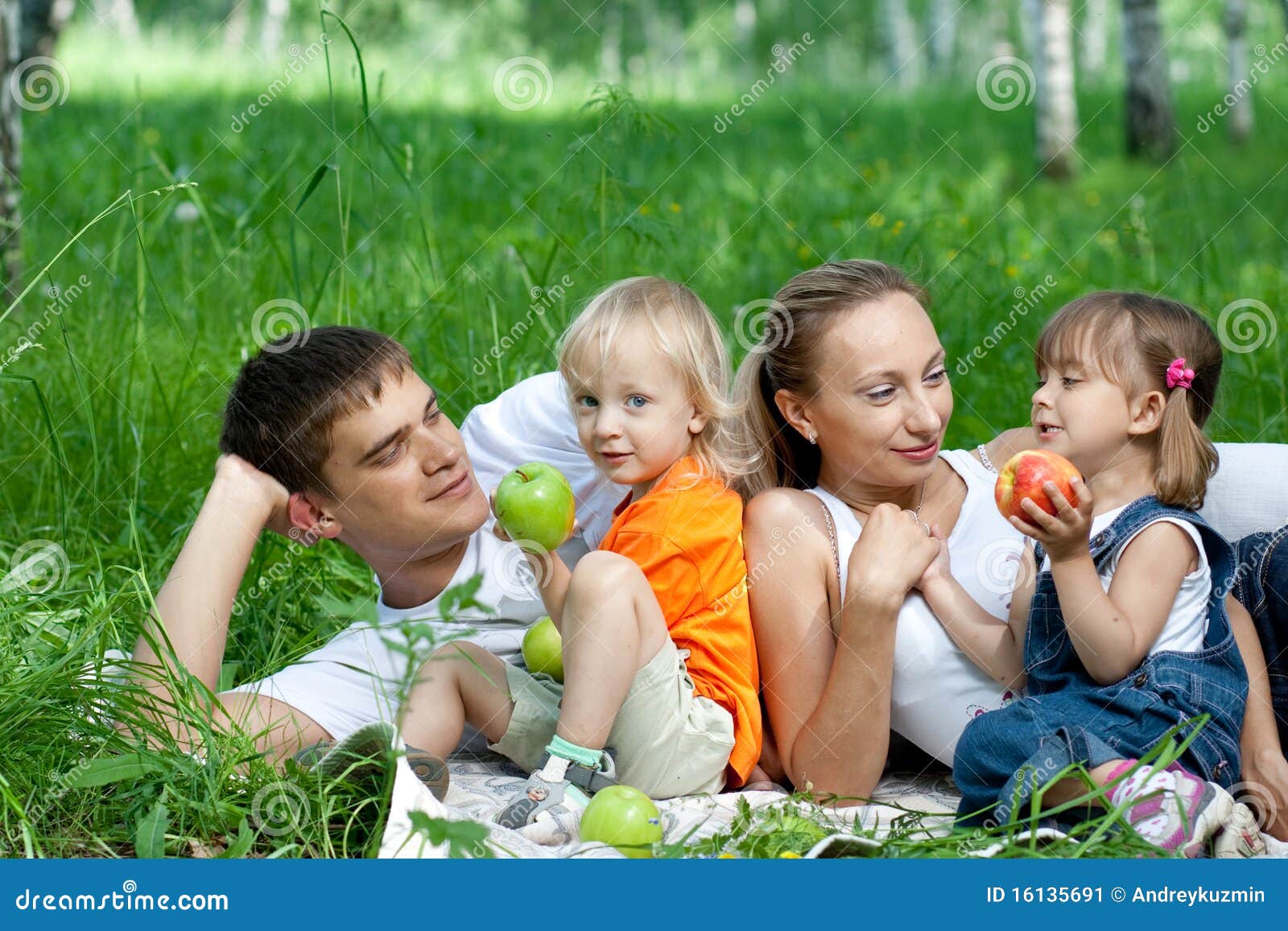 Happy family in park stock image. Image of happy, parents - 16135691