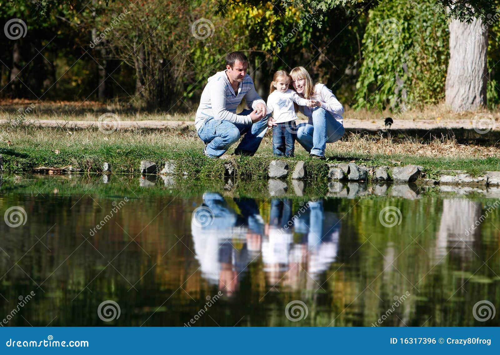 Happy family in park stock photo. Image of family, natural - 16317396