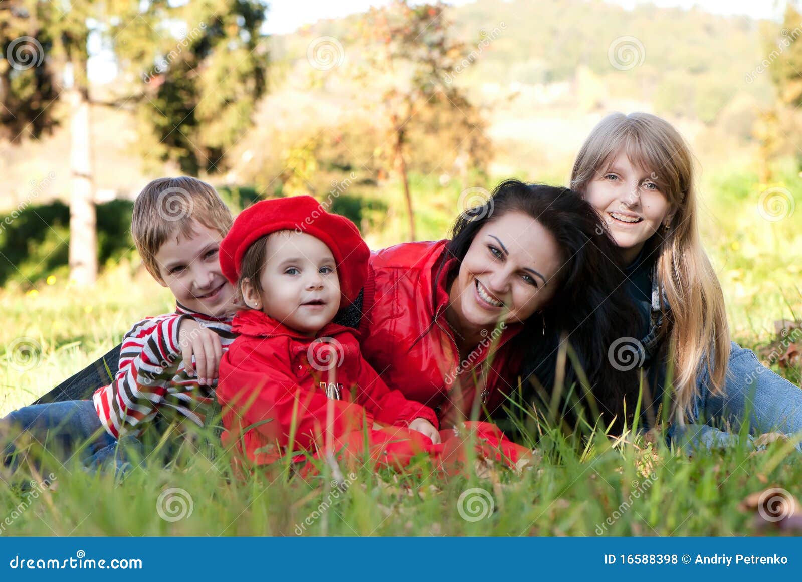 Happy family in park stock photo. Image of people, family - 16588398