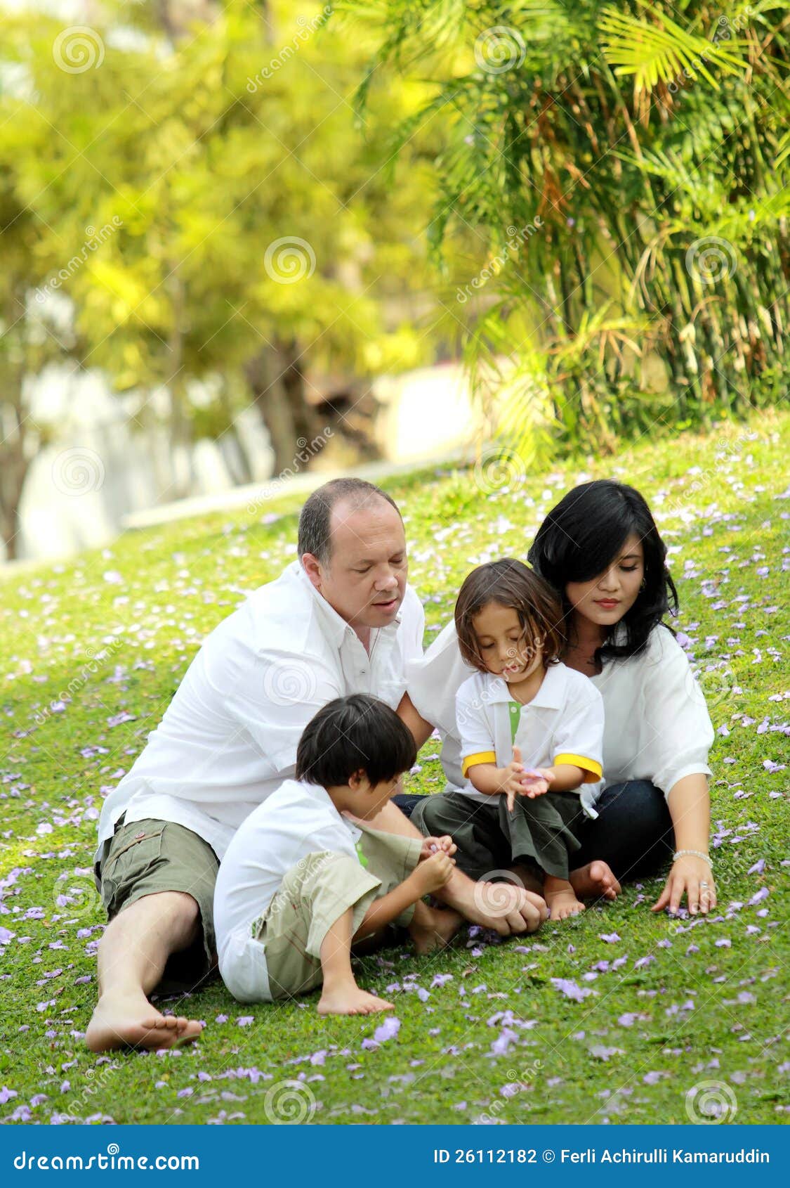 Happy family in the park stock photo. Image of park, outdoors - 26112182